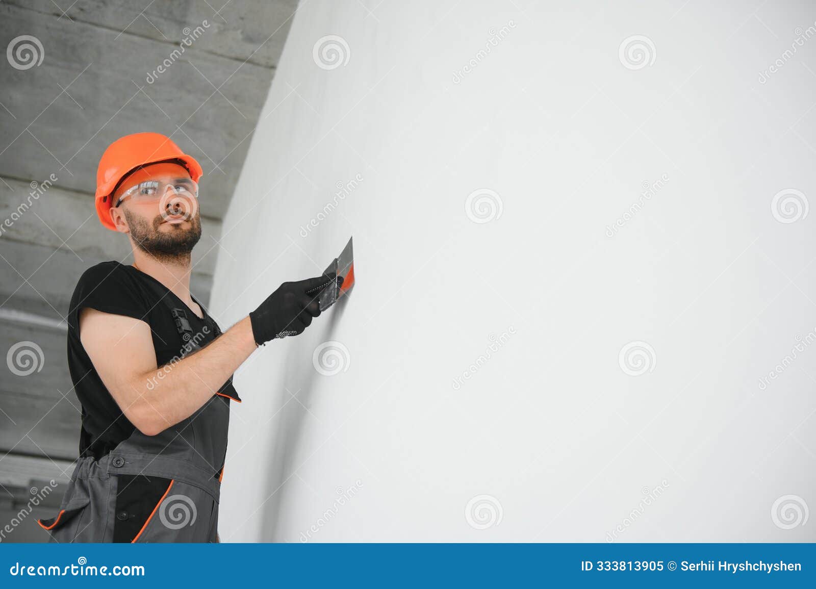 Tradesman on Stilts Plastering Drywall in Home Stock Image - Image of ...