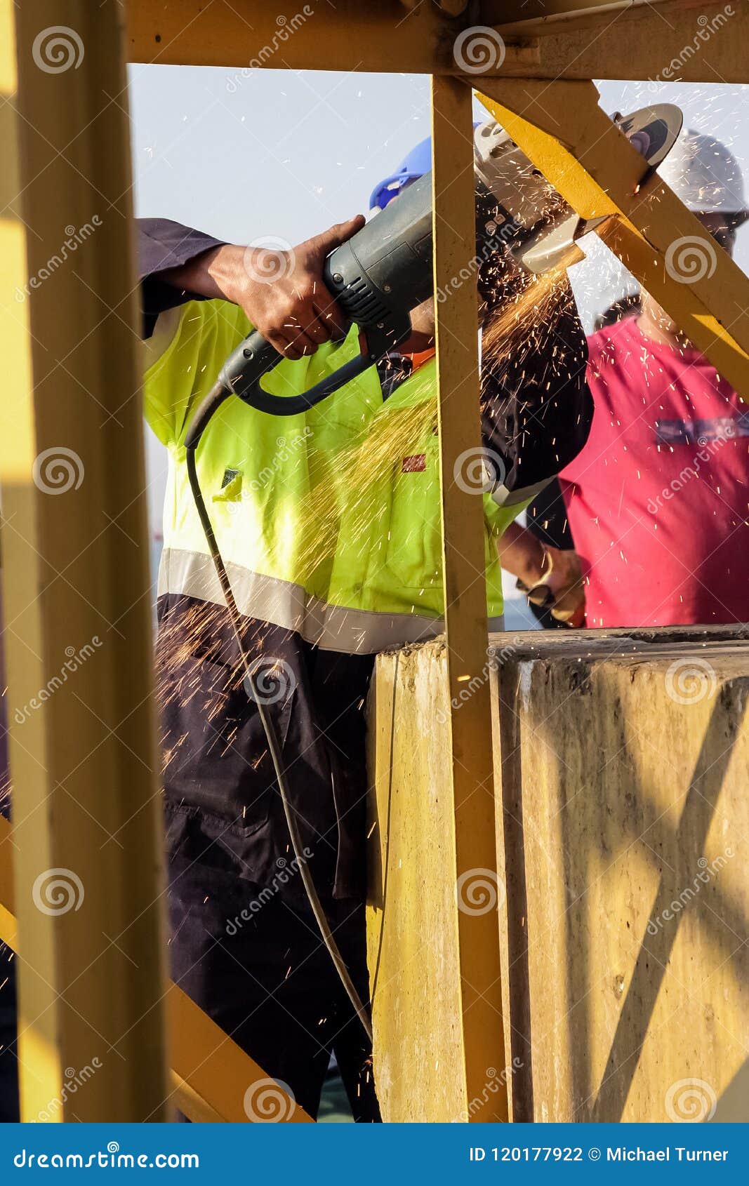 Tradesman Working with an Angle Grinder Editorial Photography - Image ...