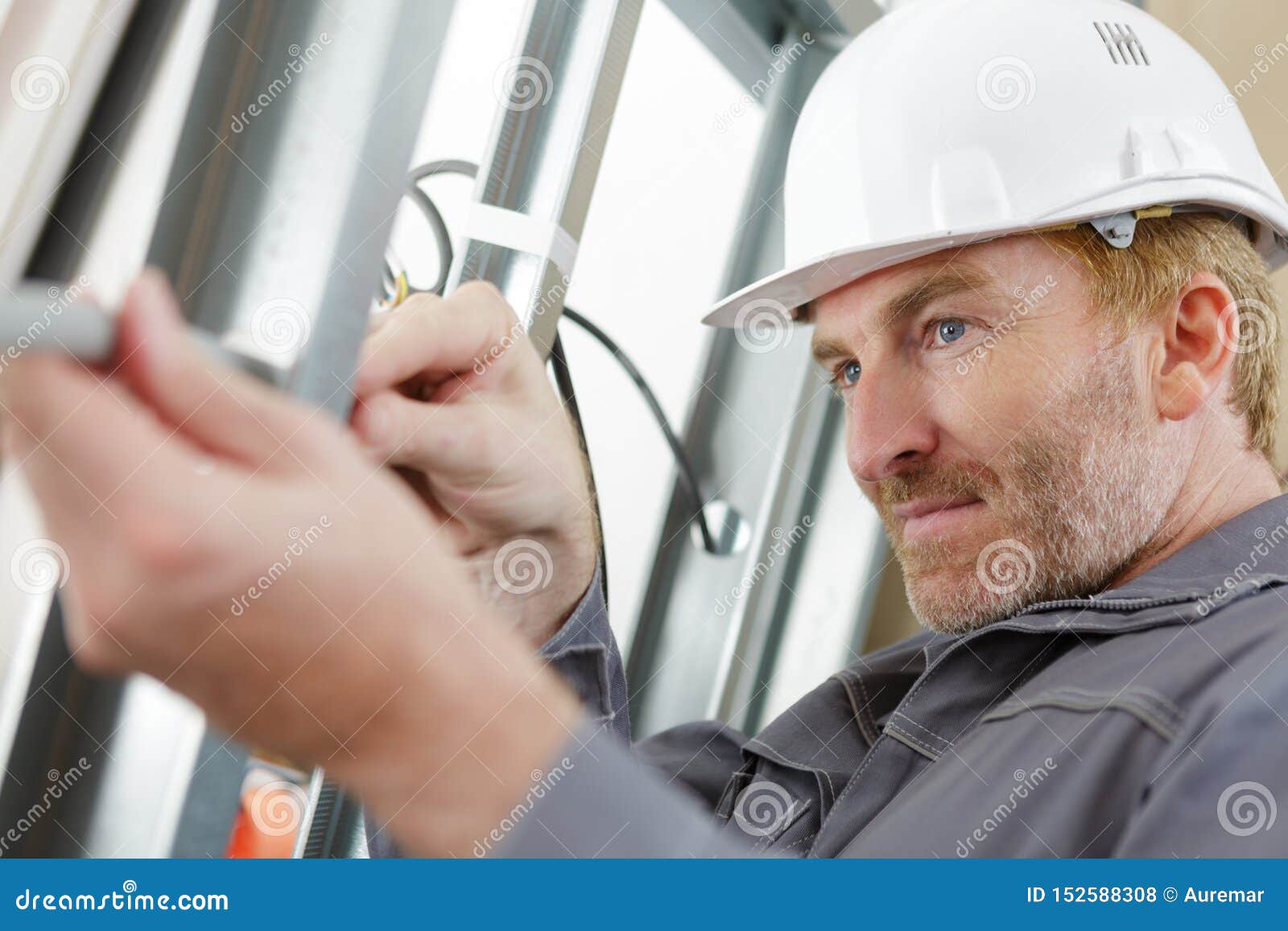 Tradesman Working with Metal Framework Stock Photo - Image of cheerful ...