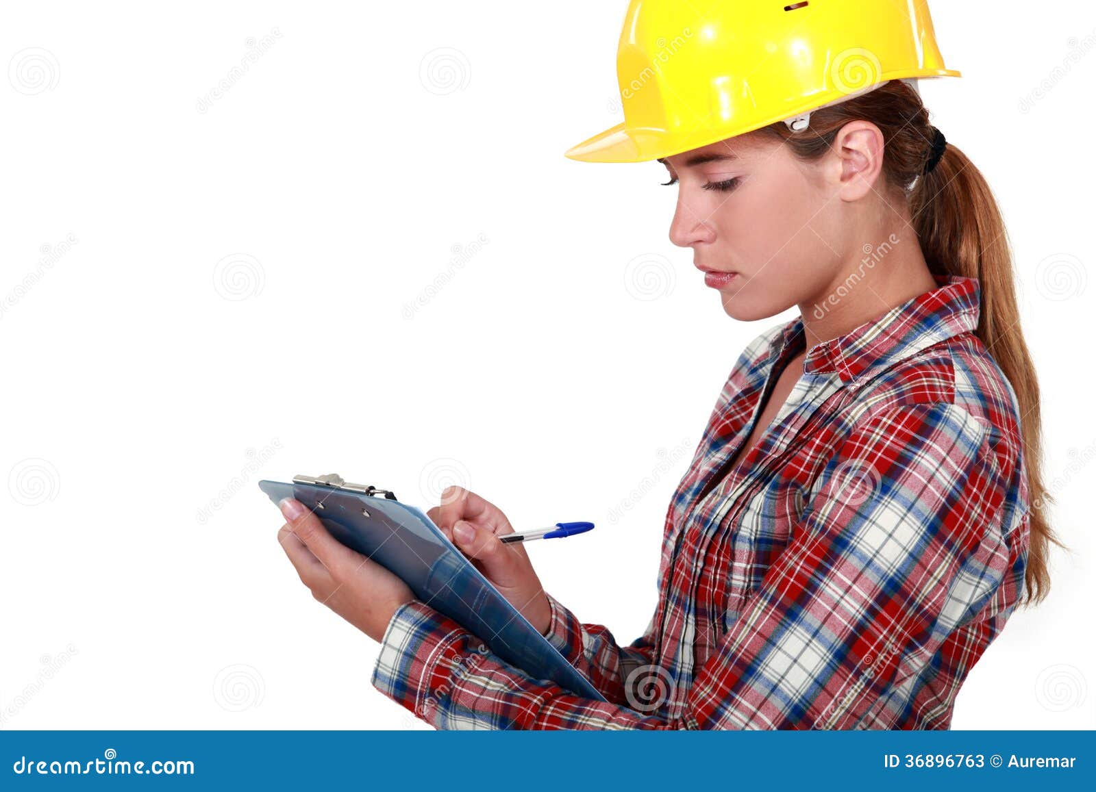 Tradeswoman Filling in Paperwork Stock Image - Image of engineering ...
