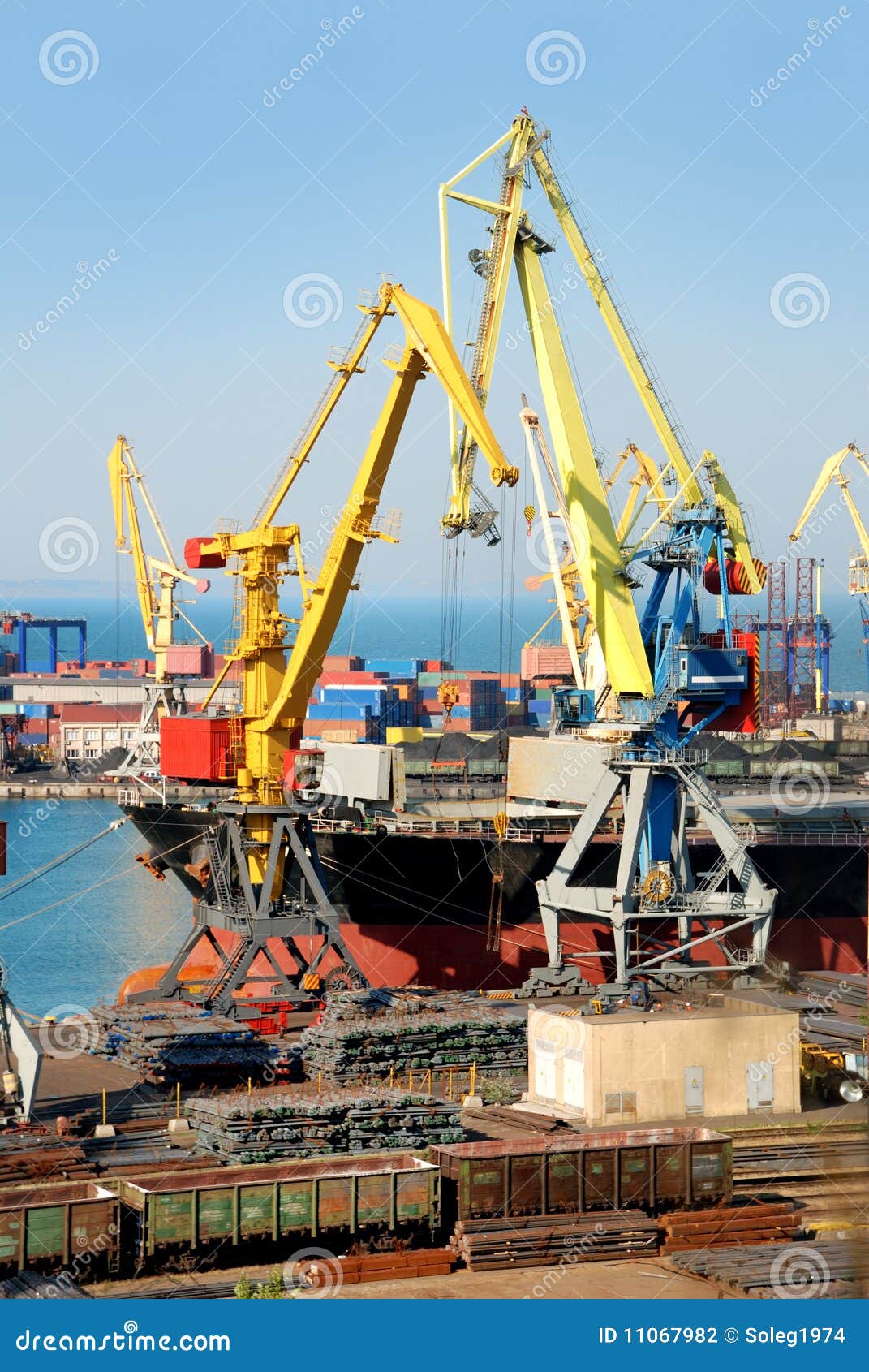 The Trading Seaport with Cranes, Cargoes and Ship Stock Photo - Image ...