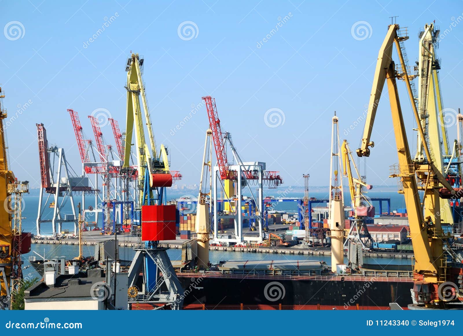 The Trading Seaport with Cranes, Cargoes and Ship Stock Photo - Image ...