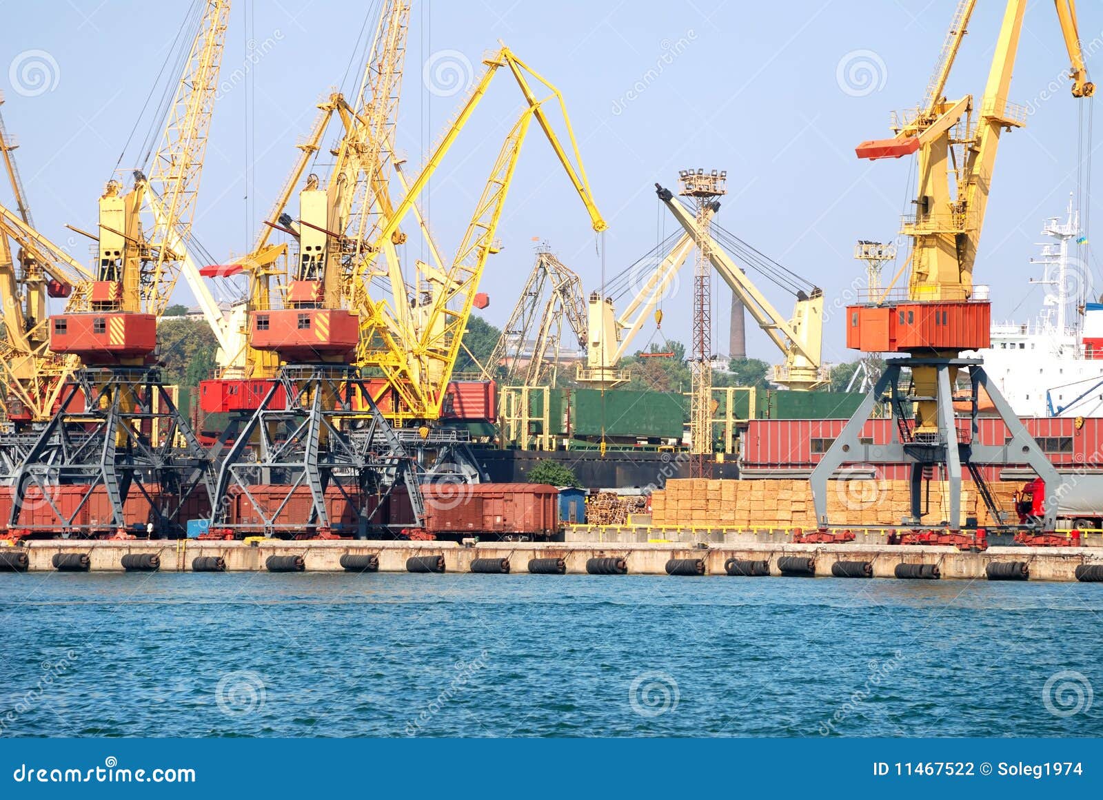 The Trading Seaport with Cranes, Cargoes and Ship Stock Photo - Image ...