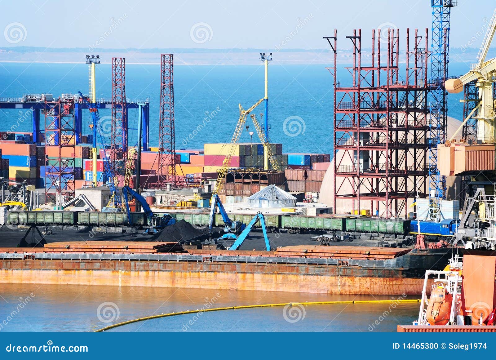The Trading Seaport with Cranes, Cargoes and Ship Stock Photo - Image ...