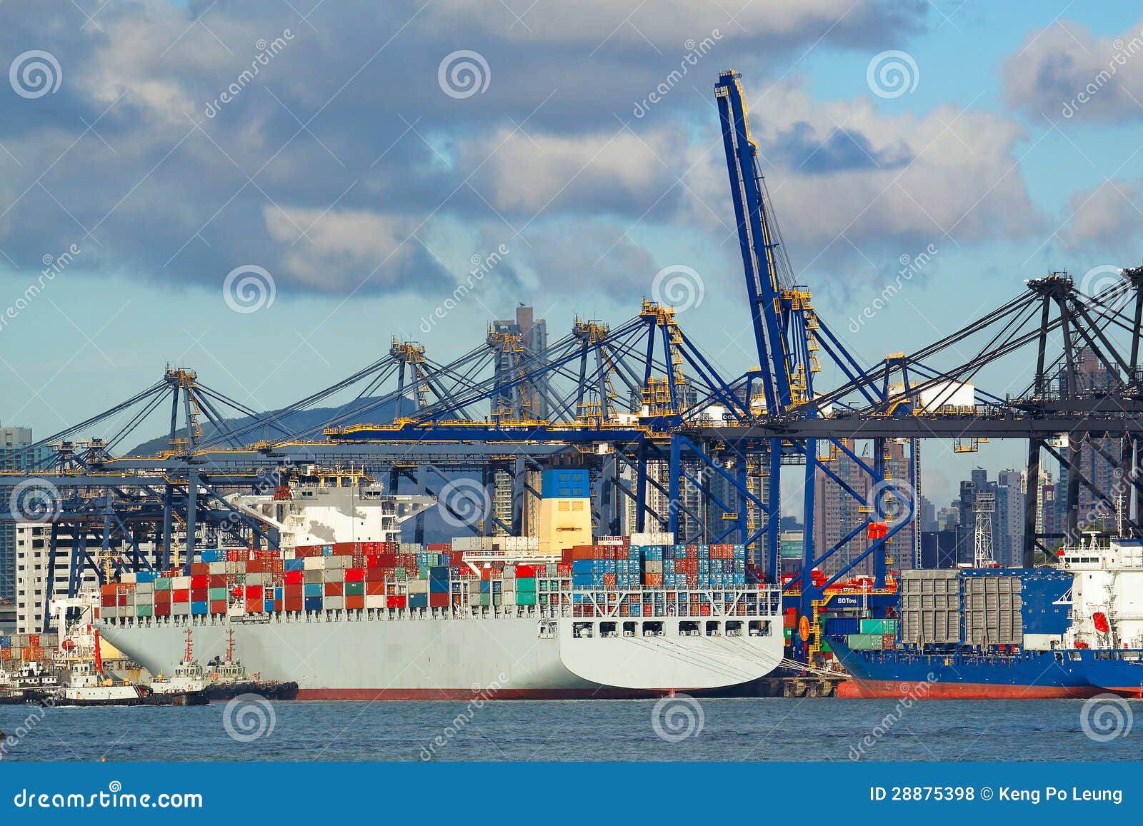 Trading Seaport with Cranes, Cargoes and the Ship Stock Photo - Image ...
