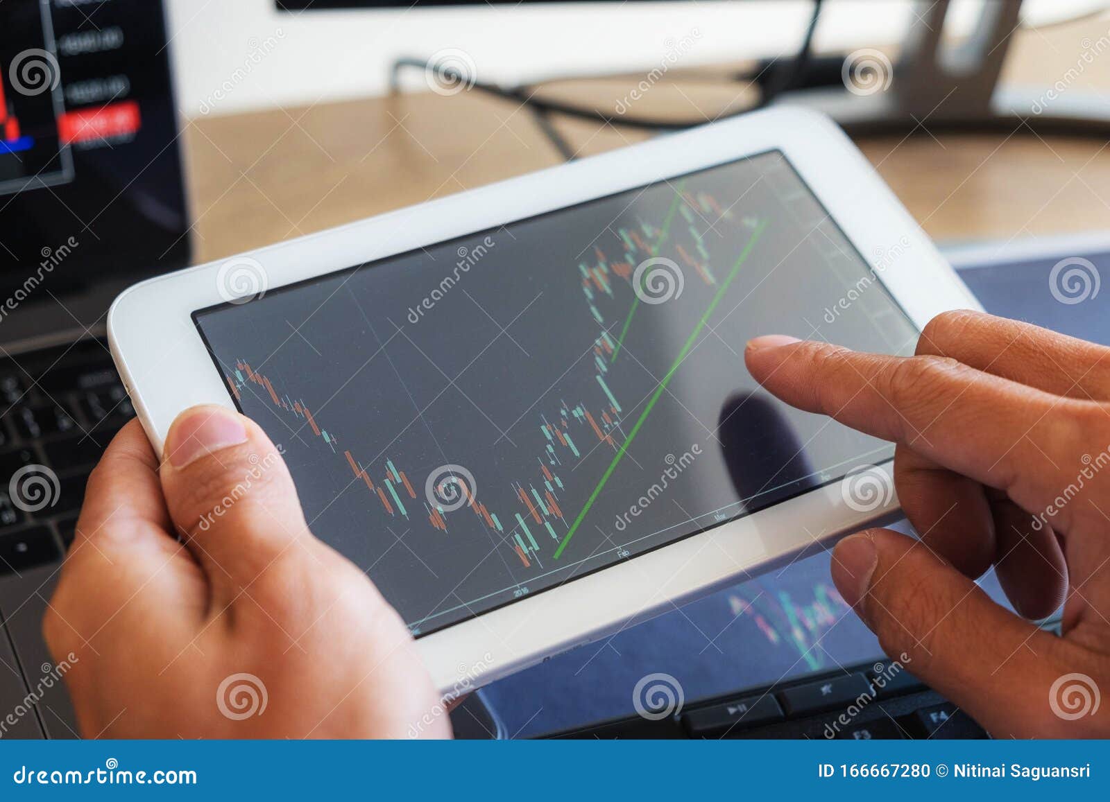 Trading on the Table is Working on a Computer Screen Full of Charts and ...