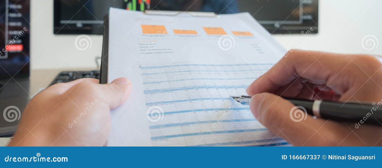 Trading on the Table is Working on a Computer Screen Full of Charts and ...