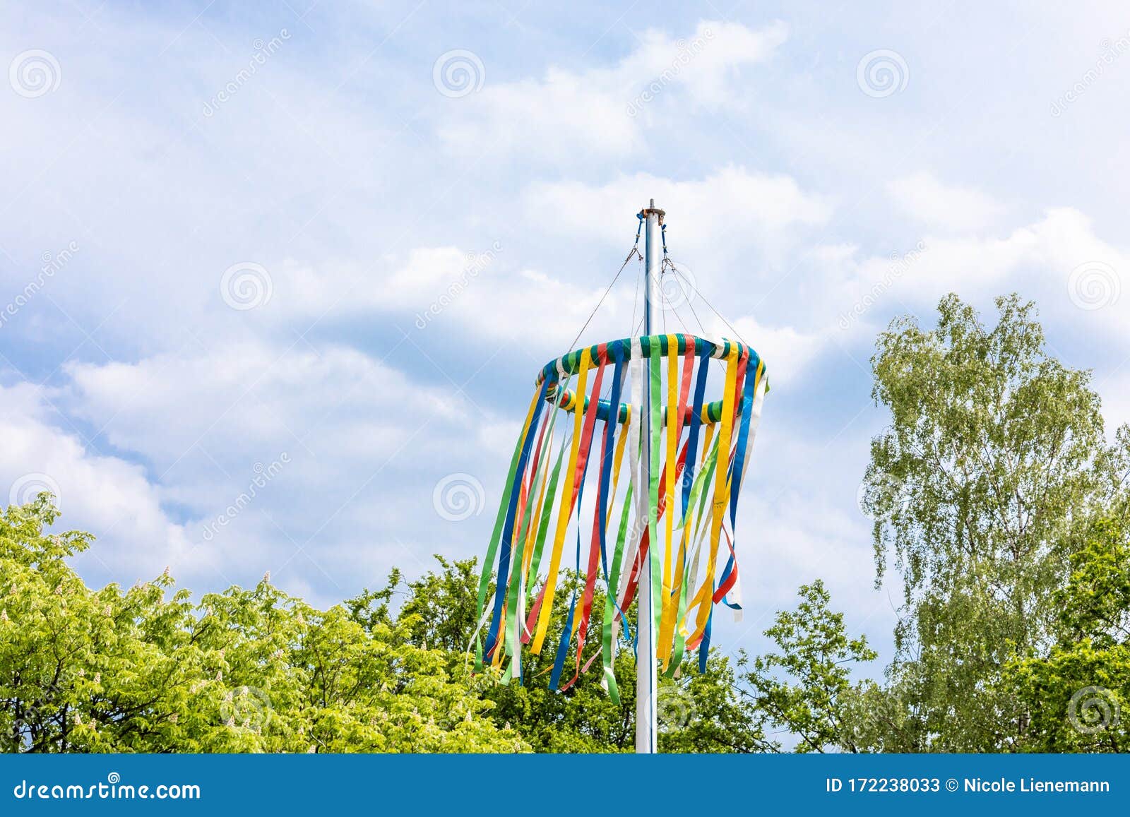 Tradiotional Maypole with Blue Sky Stock Image - Image of ribbon, white ...