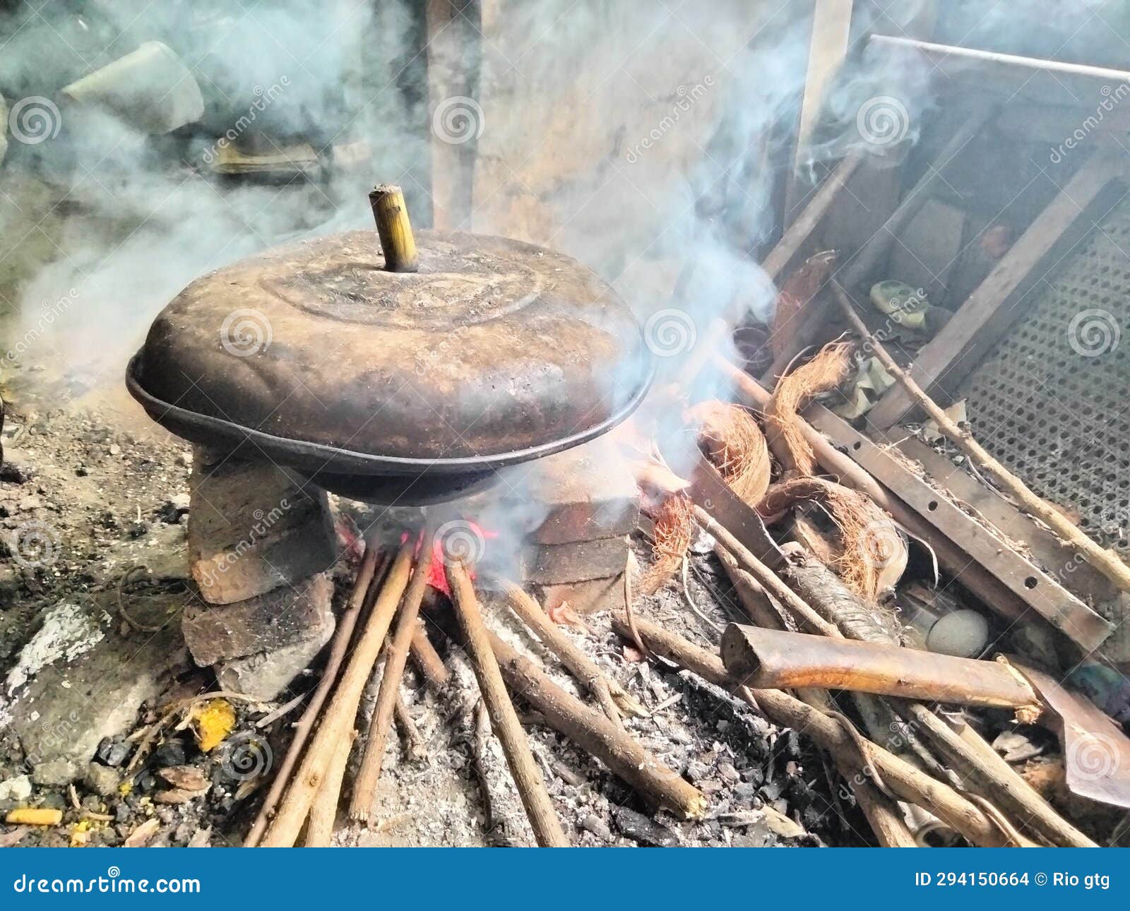 Tradisional Cooking Method Using a Pan and Firewood. Stock Photo ...