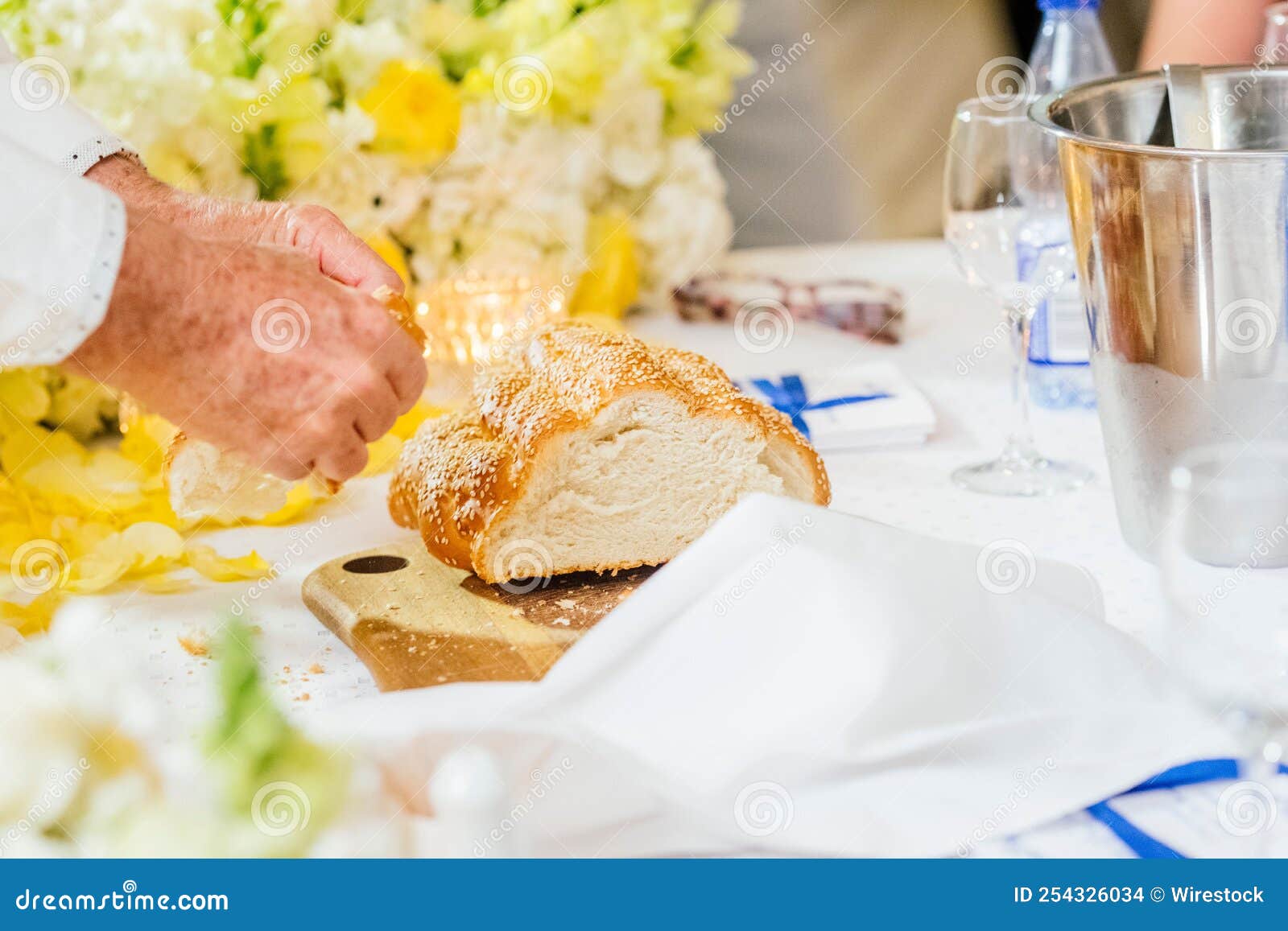Tradition of Cutting and Taking a Bite of Challah Bread during a ...
