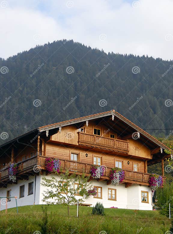 Traditional alpine house stock photo. Image of gallery - 22046116