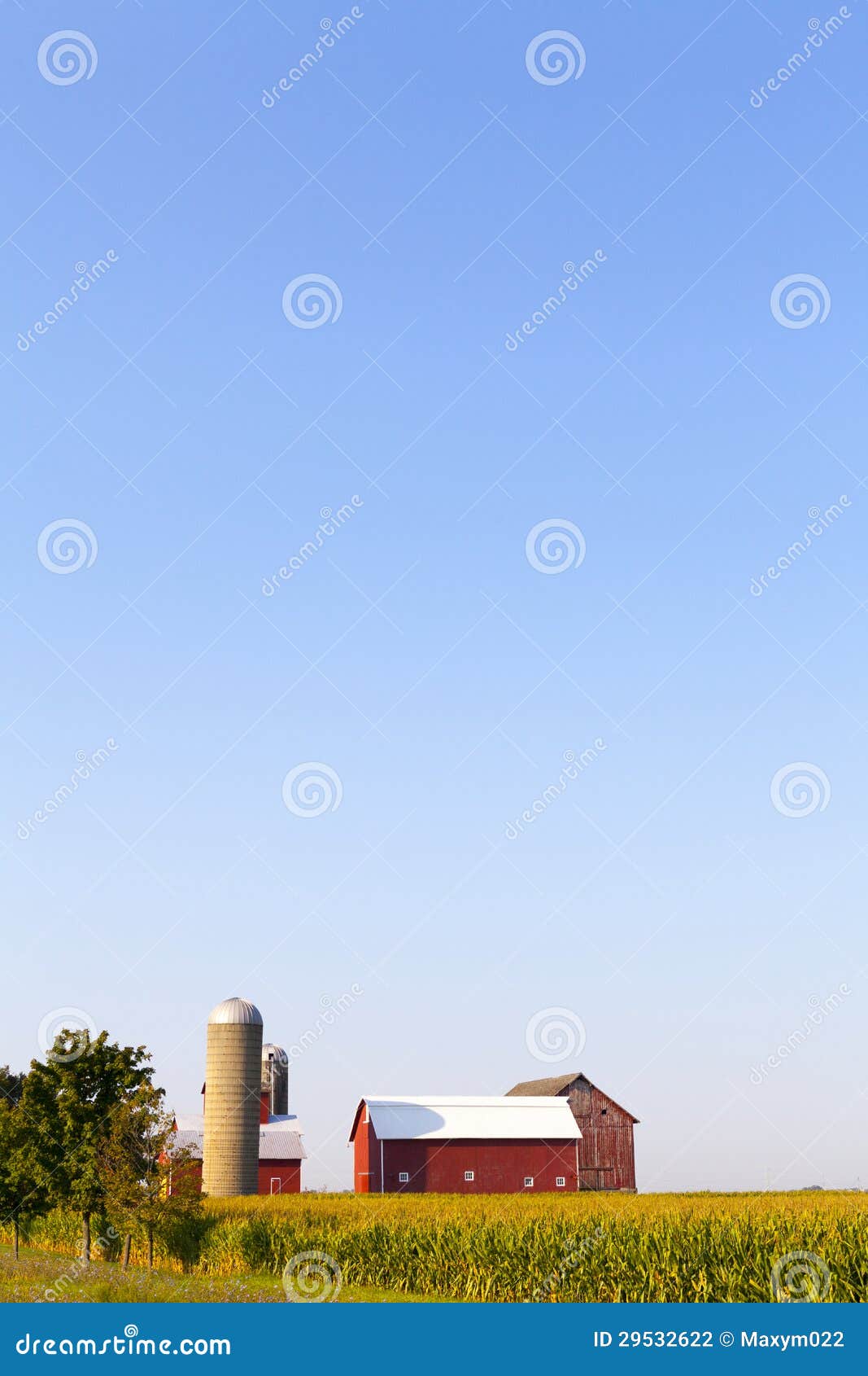 Traditional American Red Farm Stock Photo - Image of clouds, fence ...