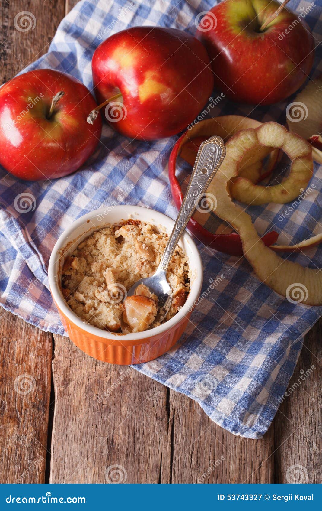 Traditional Apple Crumble Close-up in a Pot, Vertical Stock Image ...