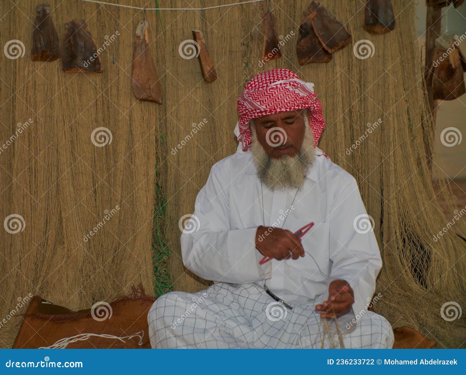A Traditional Arabic Craftsman Weaving Fishnet Editorial Photography ...