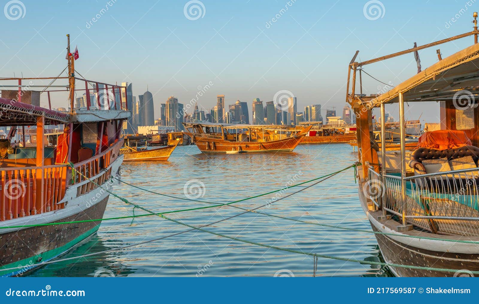 Traditional Arabic Dhow Boats Along with Doha Skyline Stock Image ...