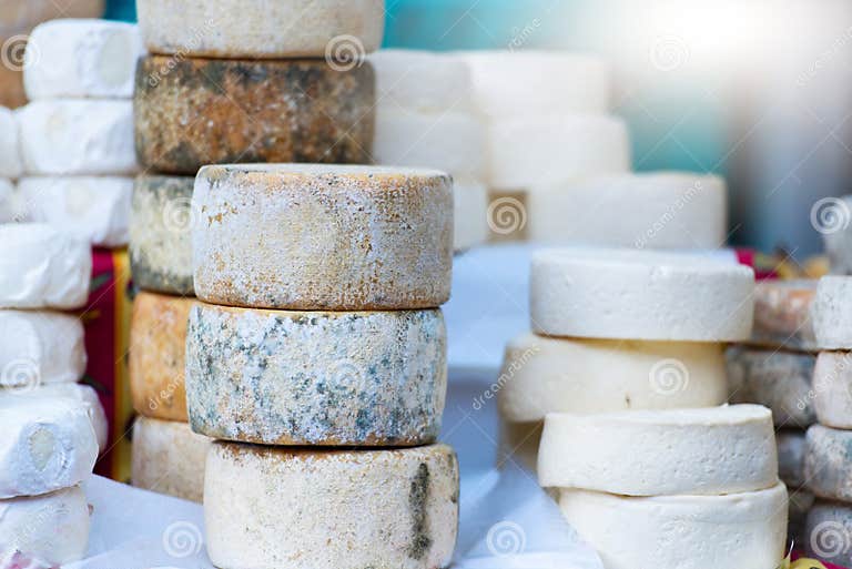 Traditional Artisan Cheese Wheels Composition Stock Photo - Image of ...