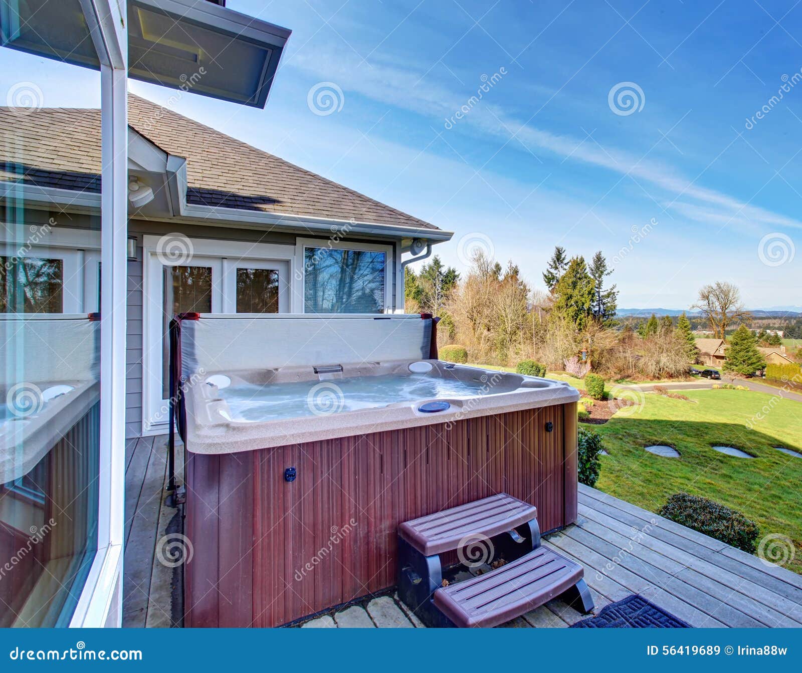 Traditional Back Deck with Tall Windows, and Jacuzzi Tub. Stock Image ...