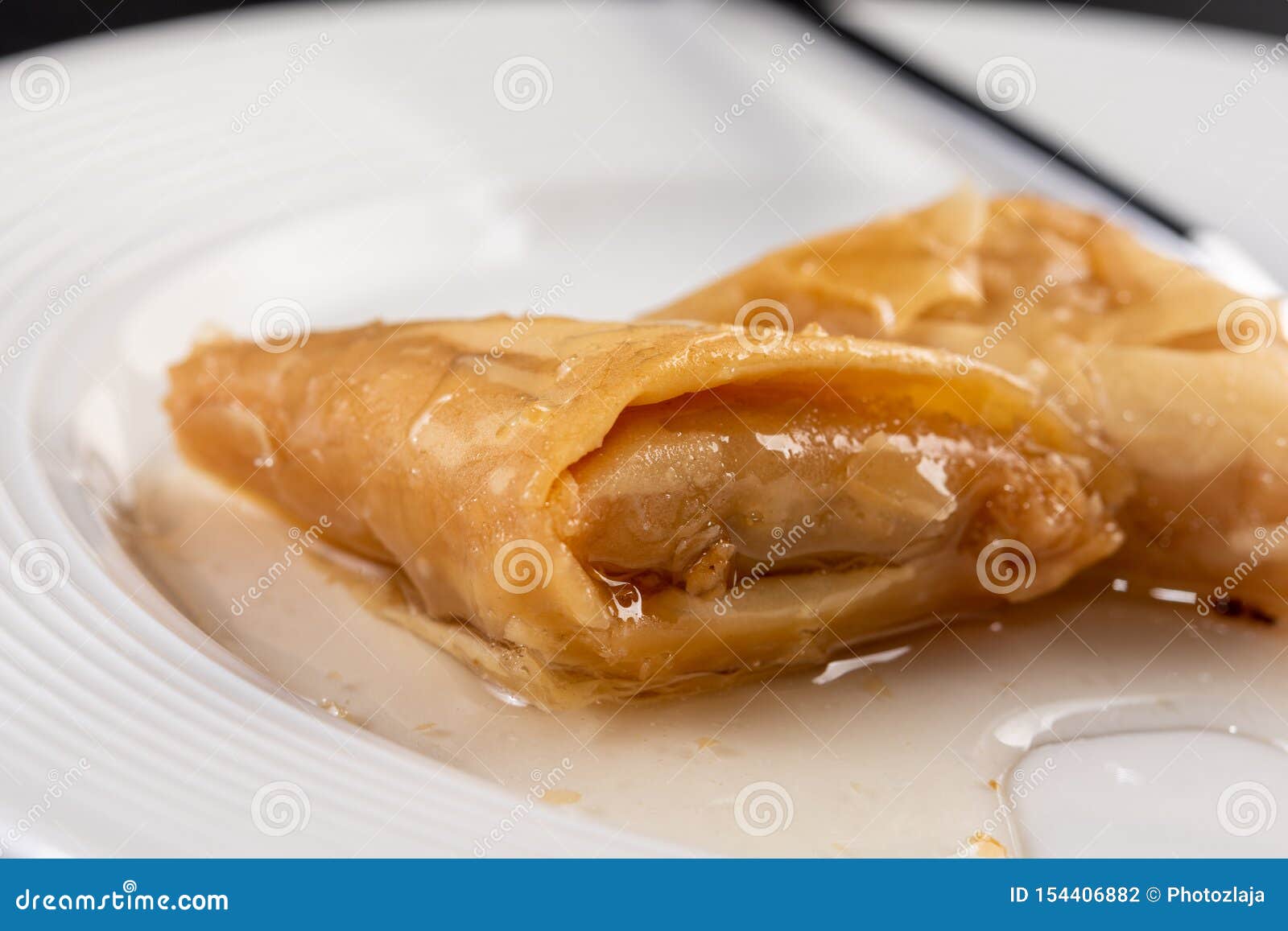 Traditional Balkan Baklava Cake with Walnuts Served on the Plate Stock ...
