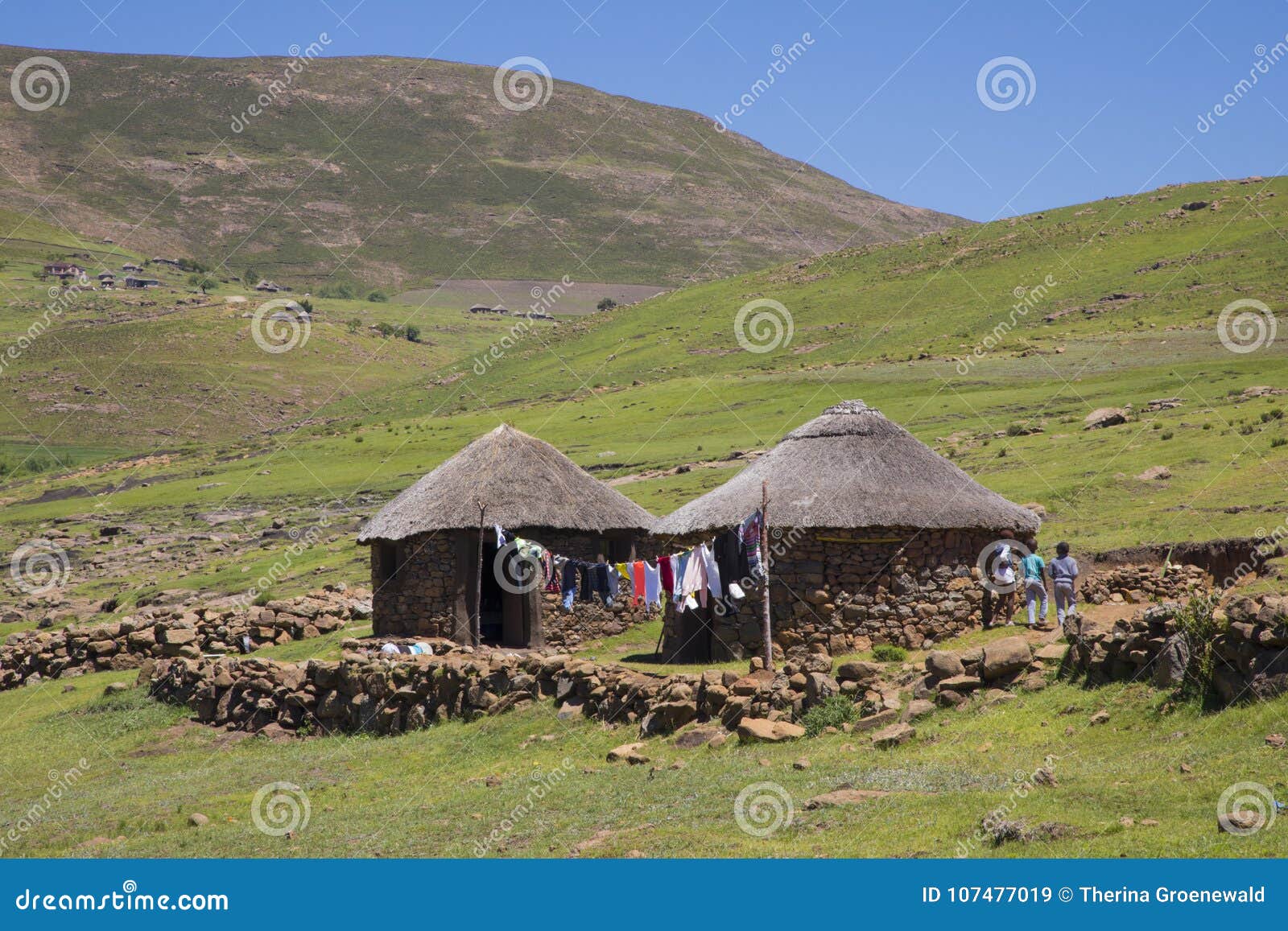 Two Stone Rondavels with Traditional Thatched Roofs. Editorial Stock ...