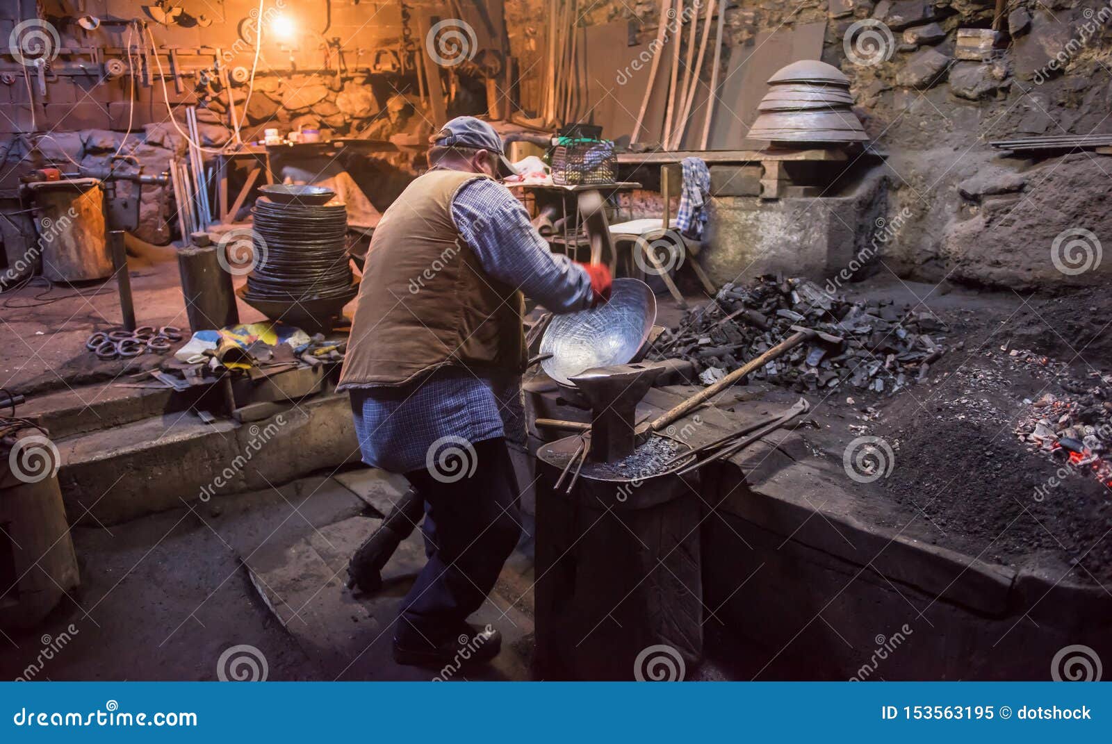 Traditional Blacksmith Manually Forging the Molten Metal Stock Image ...