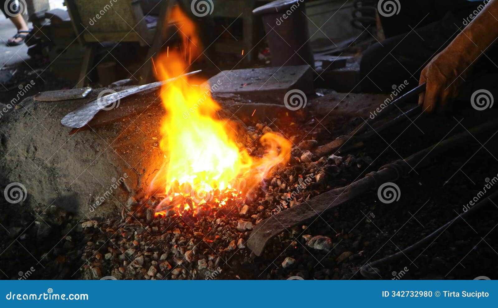 Traditional Blacksmithing: the Process of Forging Metal Over Fire Stock ...