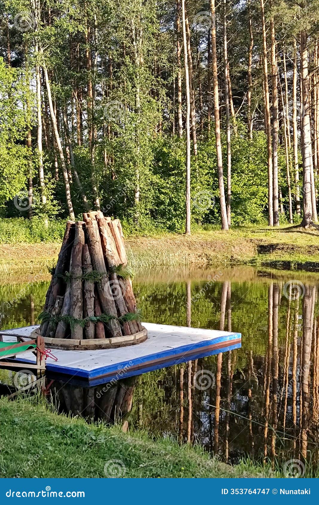 Traditional Bonfire Structure on a Floating Platform in a Forest ...
