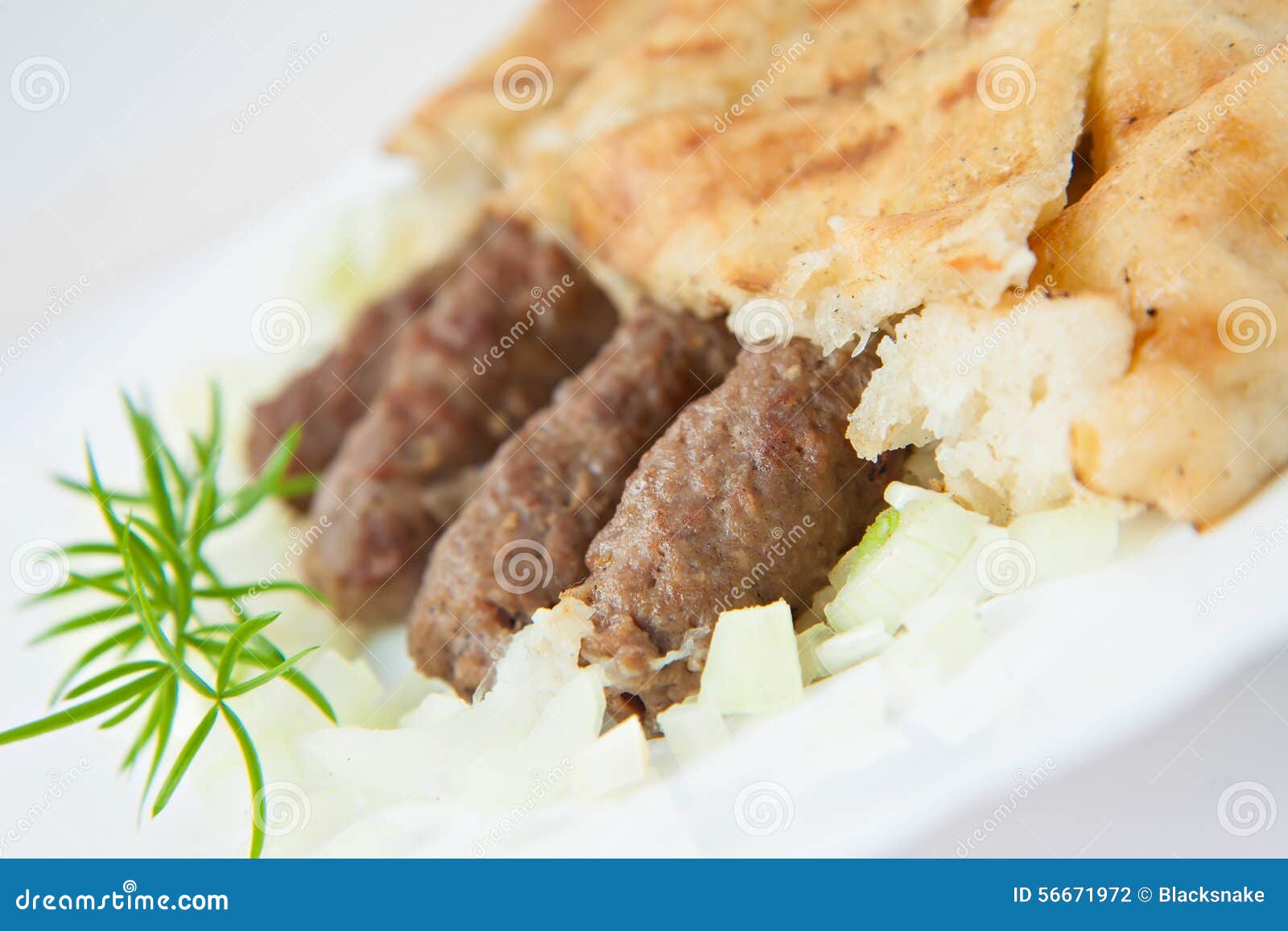 Traditional Bosnian Food Cevapi with Flat Bread and Onion Stock Photo ...