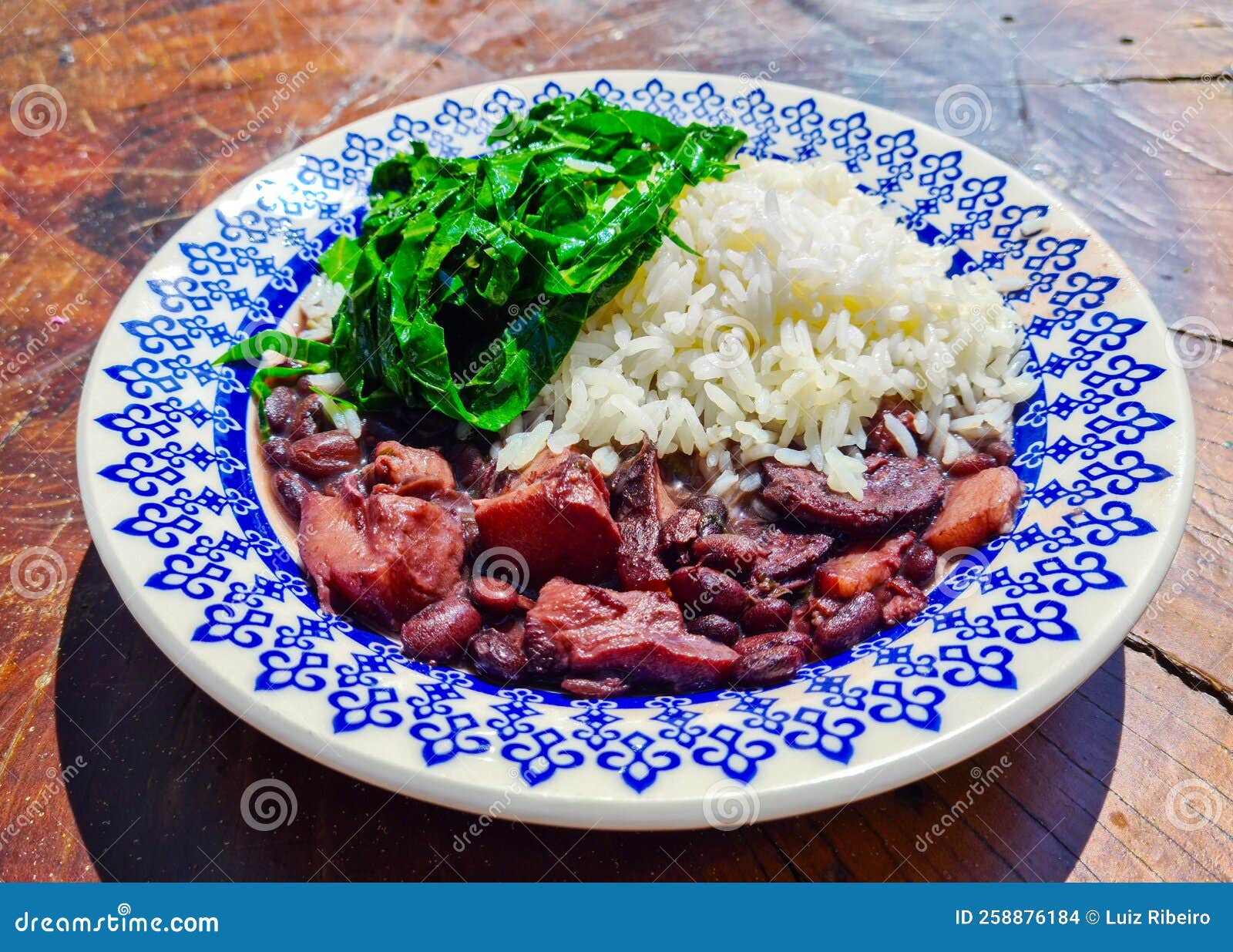 Traditional Brazilian Feijoada with Cabbage and Rice Stock Photo ...