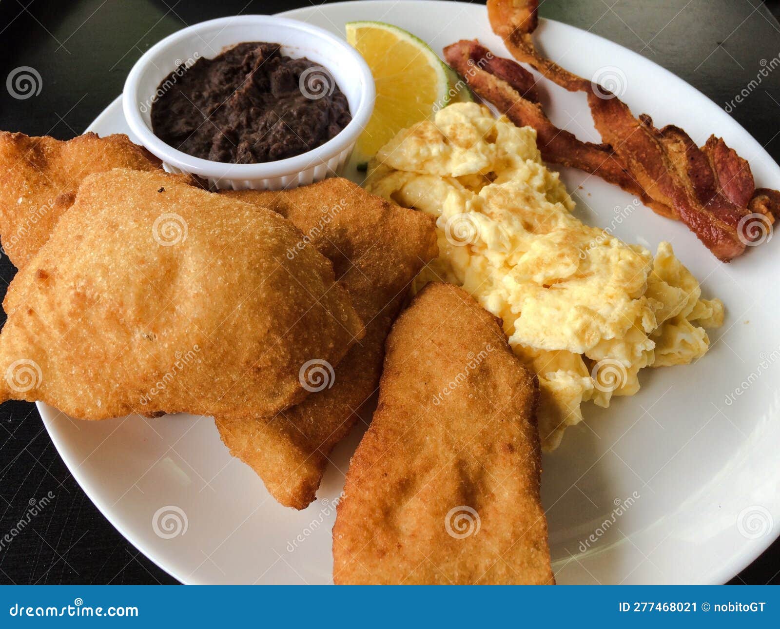 Traditional Breakfast with Fry Jacks in Belize Stock Image - Image of ...