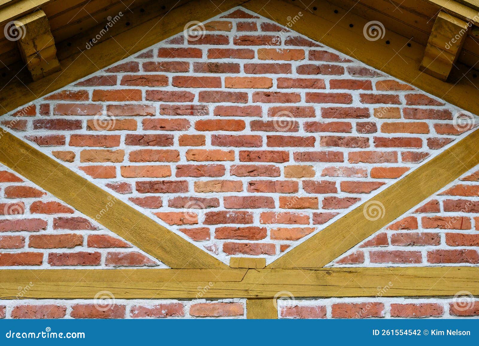 Traditional Brick Wall with Wood Inserts, As a Graphic Background Stock Photo - Image of ...