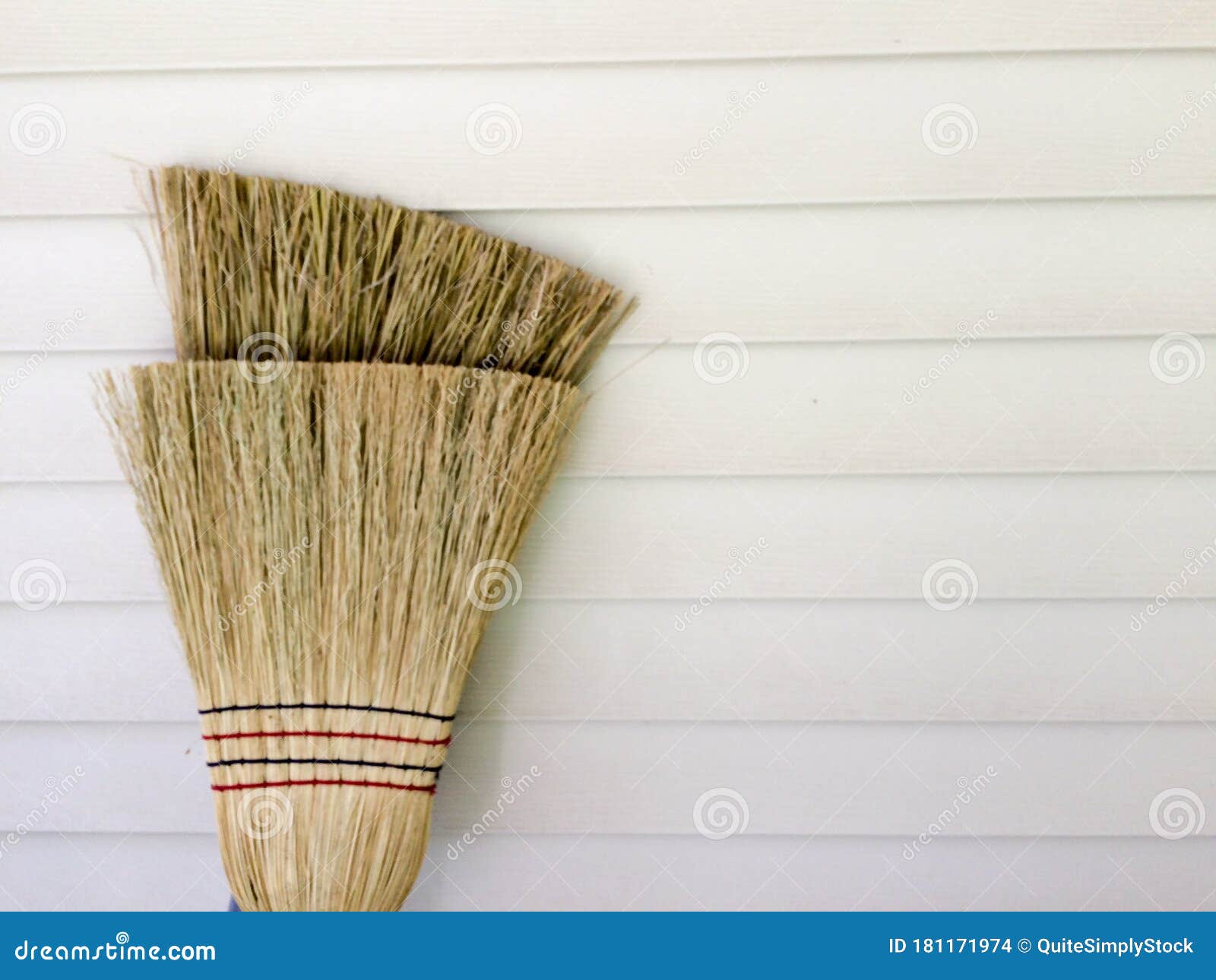An Old Broom On The Background Of A Blue Antique Wooden Door Stock ...