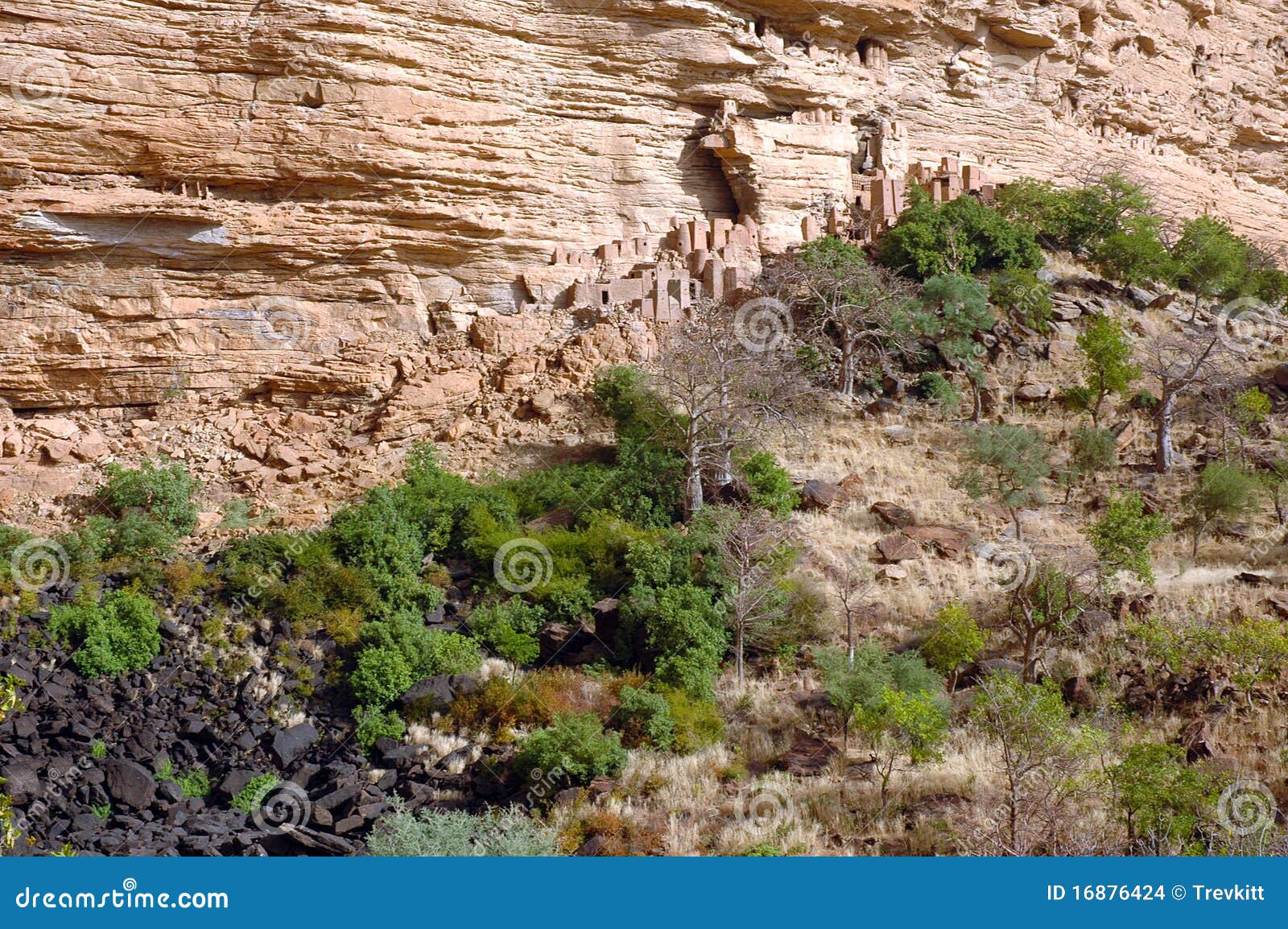 Traditional Buildings Along a Cliff Base Stock Photo - Image of ...