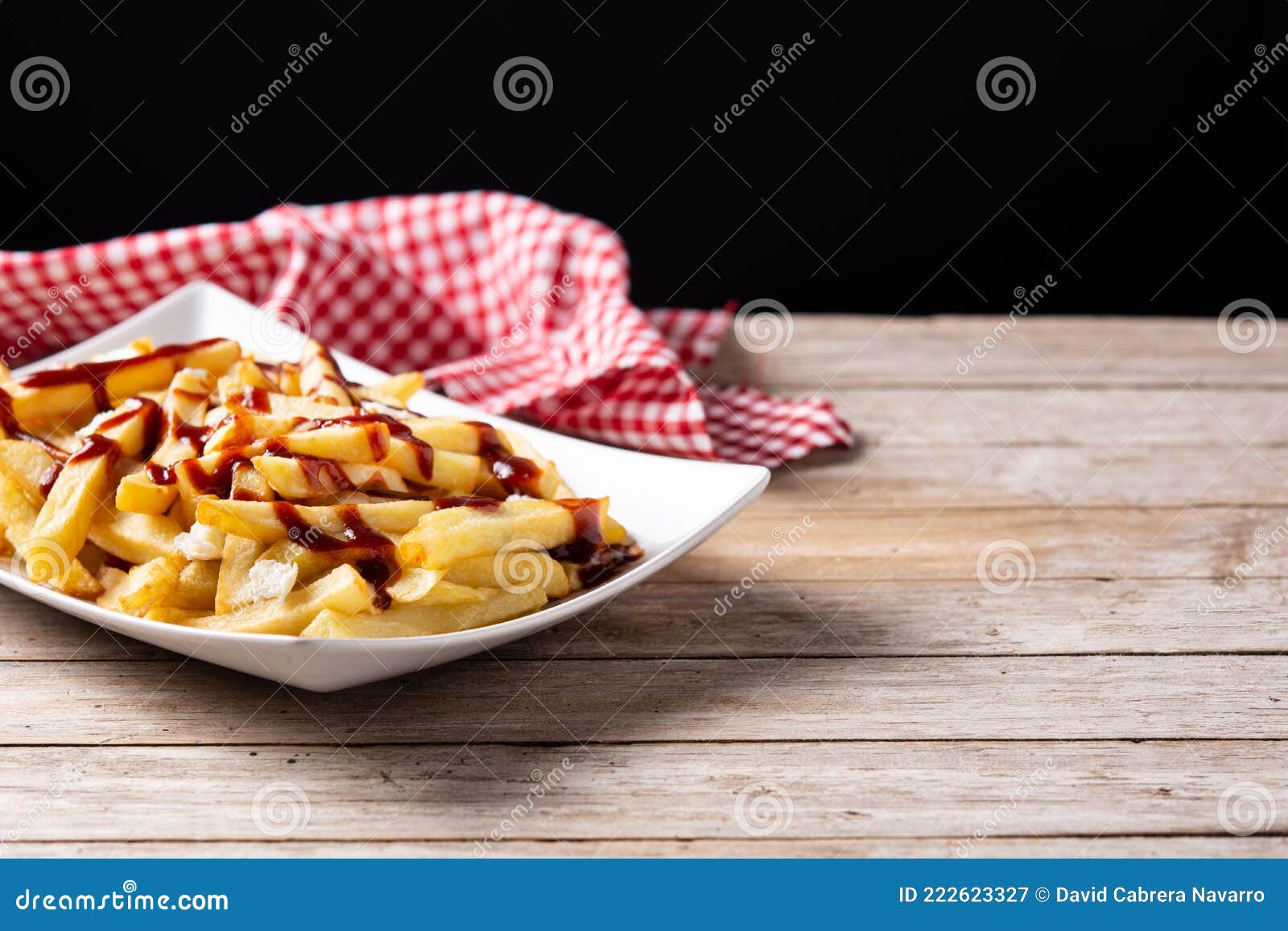 Traditional Canadian Poutine on Wooden Table Stock Image - Image of ...