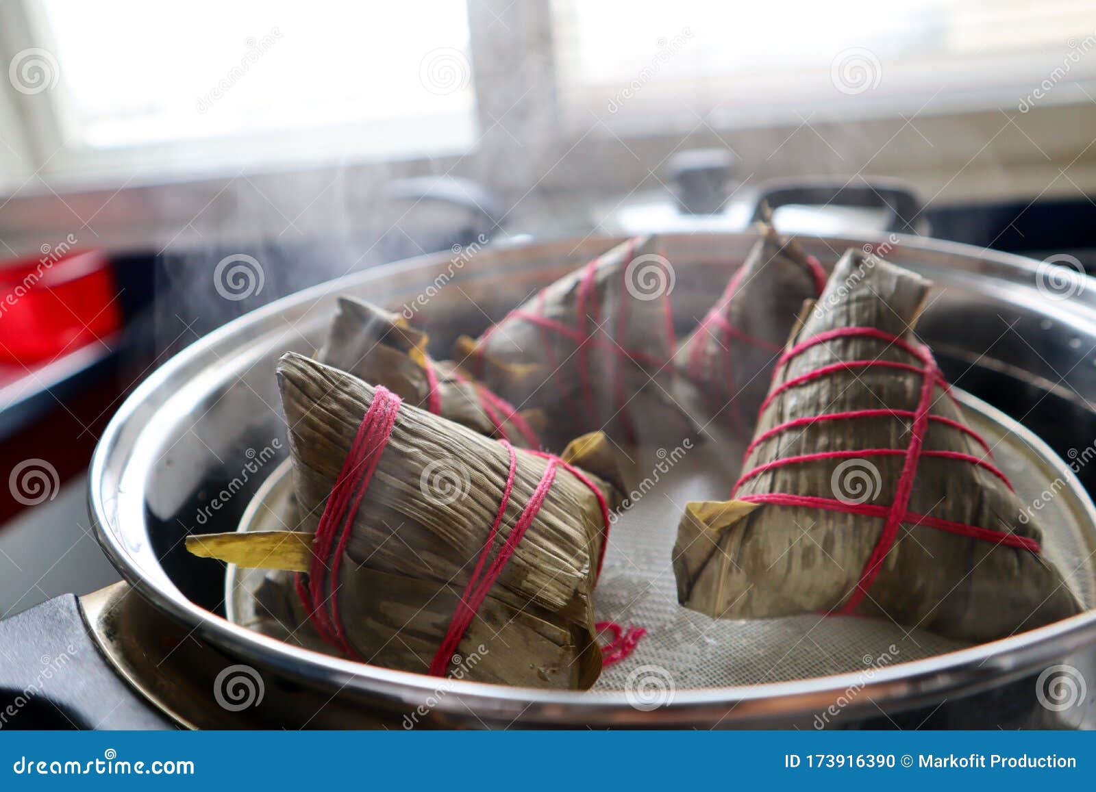Traditional Chinese Dessert Made with White Rice and Bamboo Leafs Stock ...