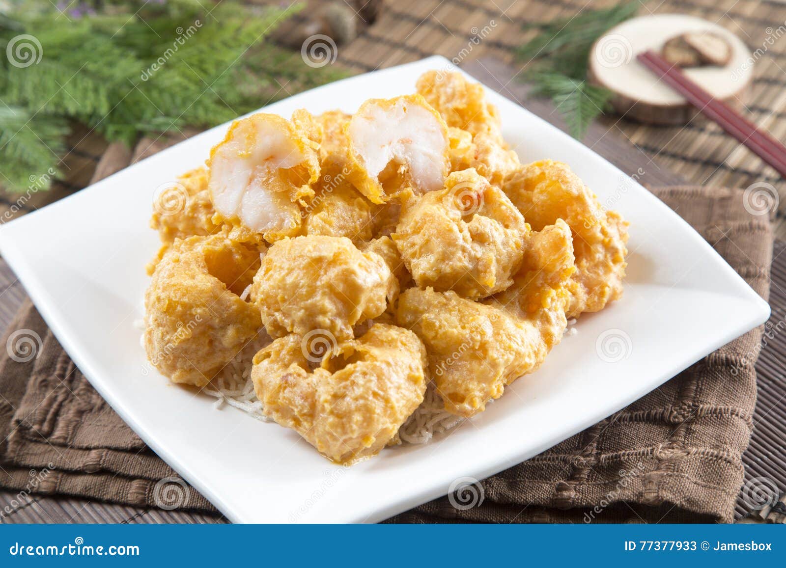 Traditional Chinese Plate of Fried Breaded Squids on the Table I Stock ...