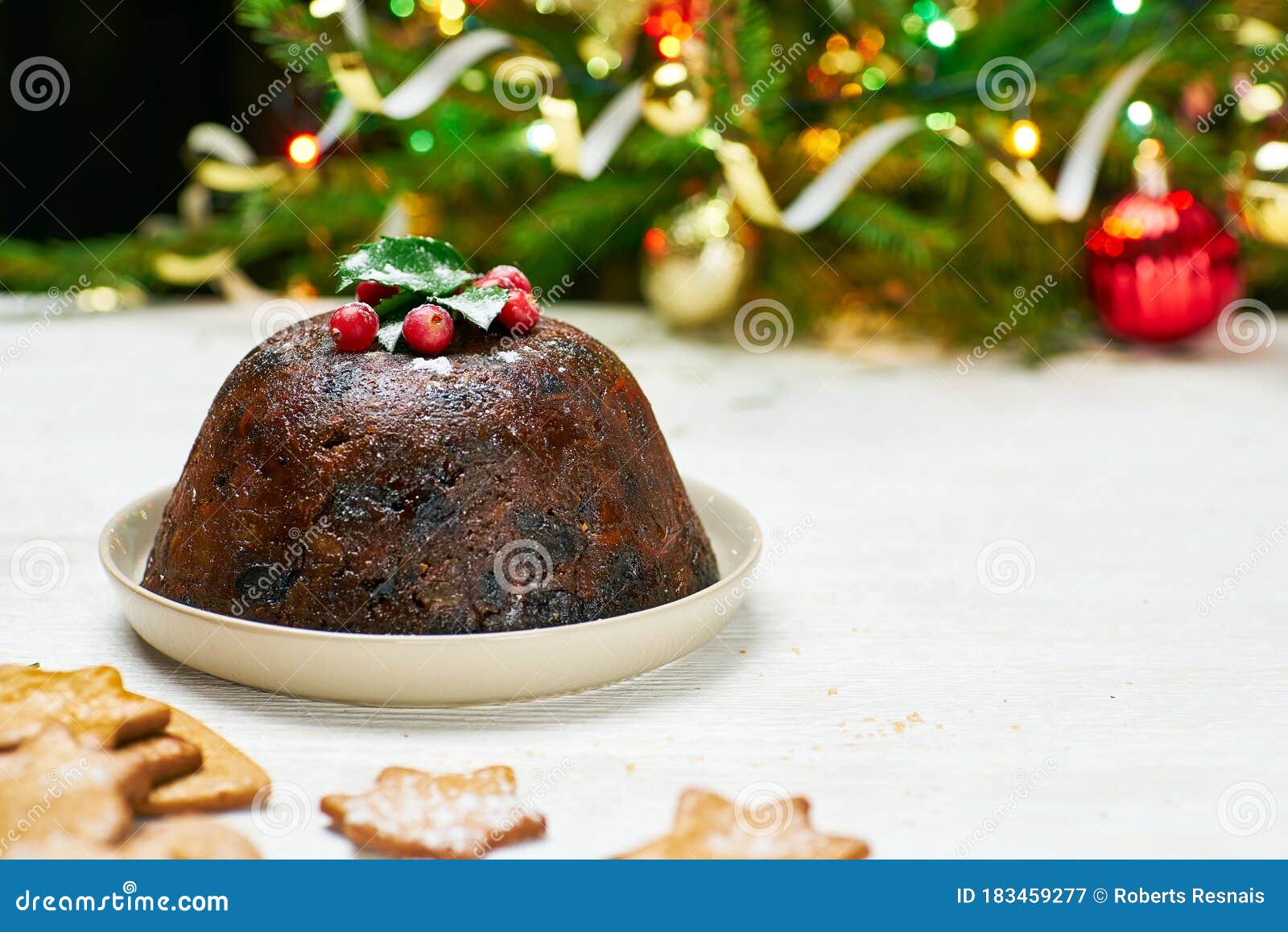 Traditional Christmas Pudding on Fir Tree Background Stock Image ...