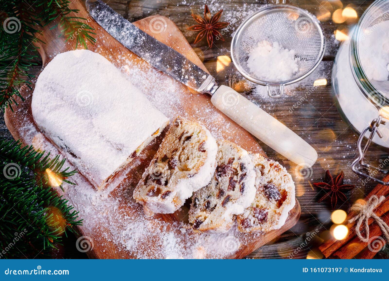 Traditional Christmas Stollen Fruit Cake on Wooden Background with ...
