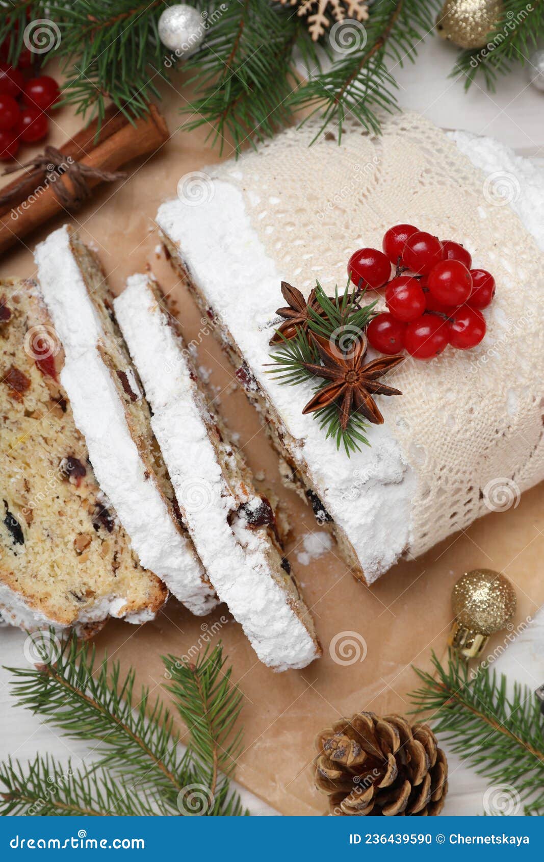 Traditional Christmas Stollen with Icing Sugar on White Table, Flat Lay ...