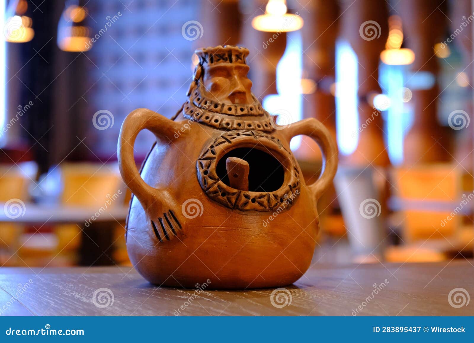Traditional Clay Jug with Intricate Patterns and a Hole. Used for ...