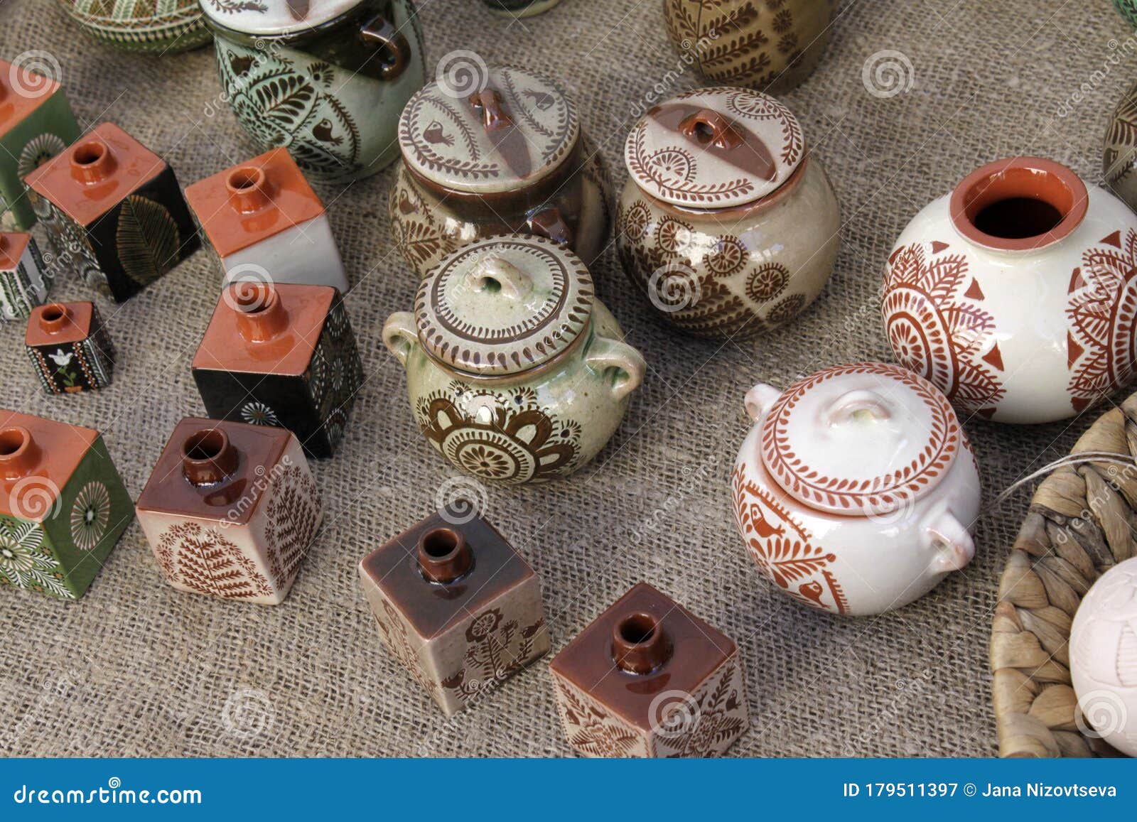 Traditional Clay Pots with Enamel on a Table Covered with Burlap Stock ...