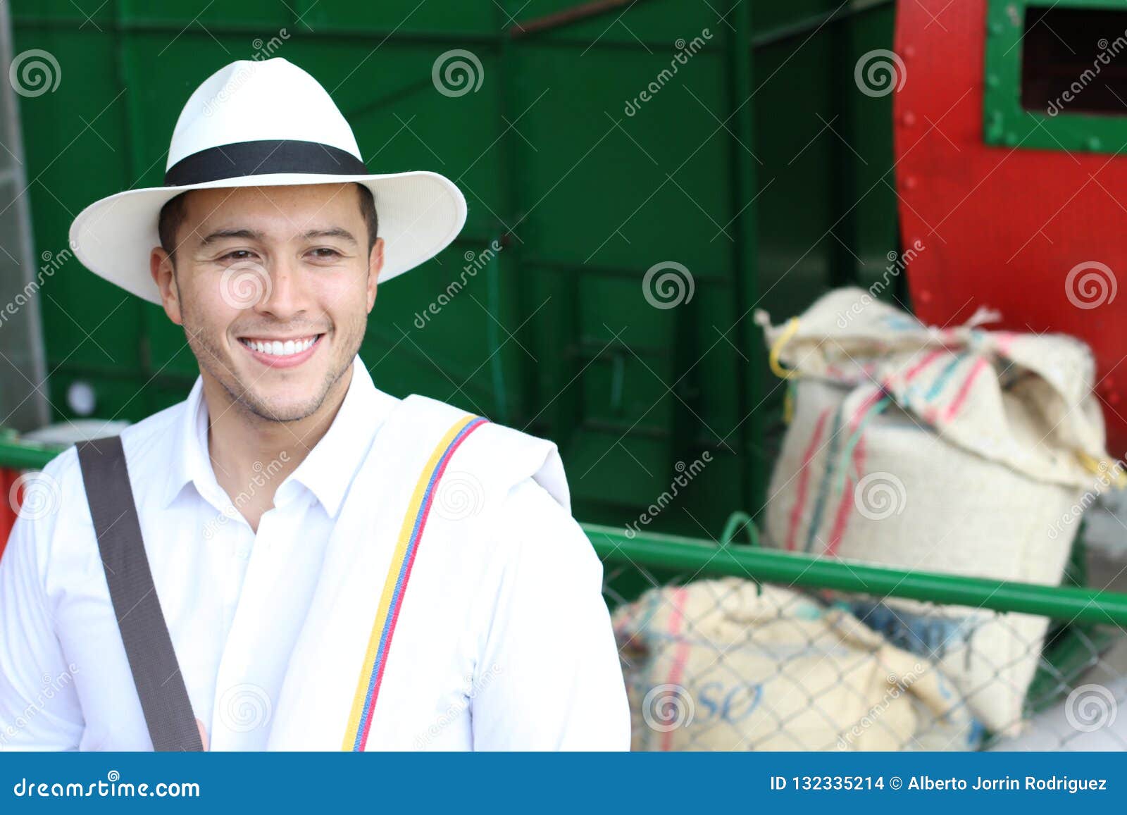 Traditional Coffee Worker with Coffee Bags in the Background Stock ...