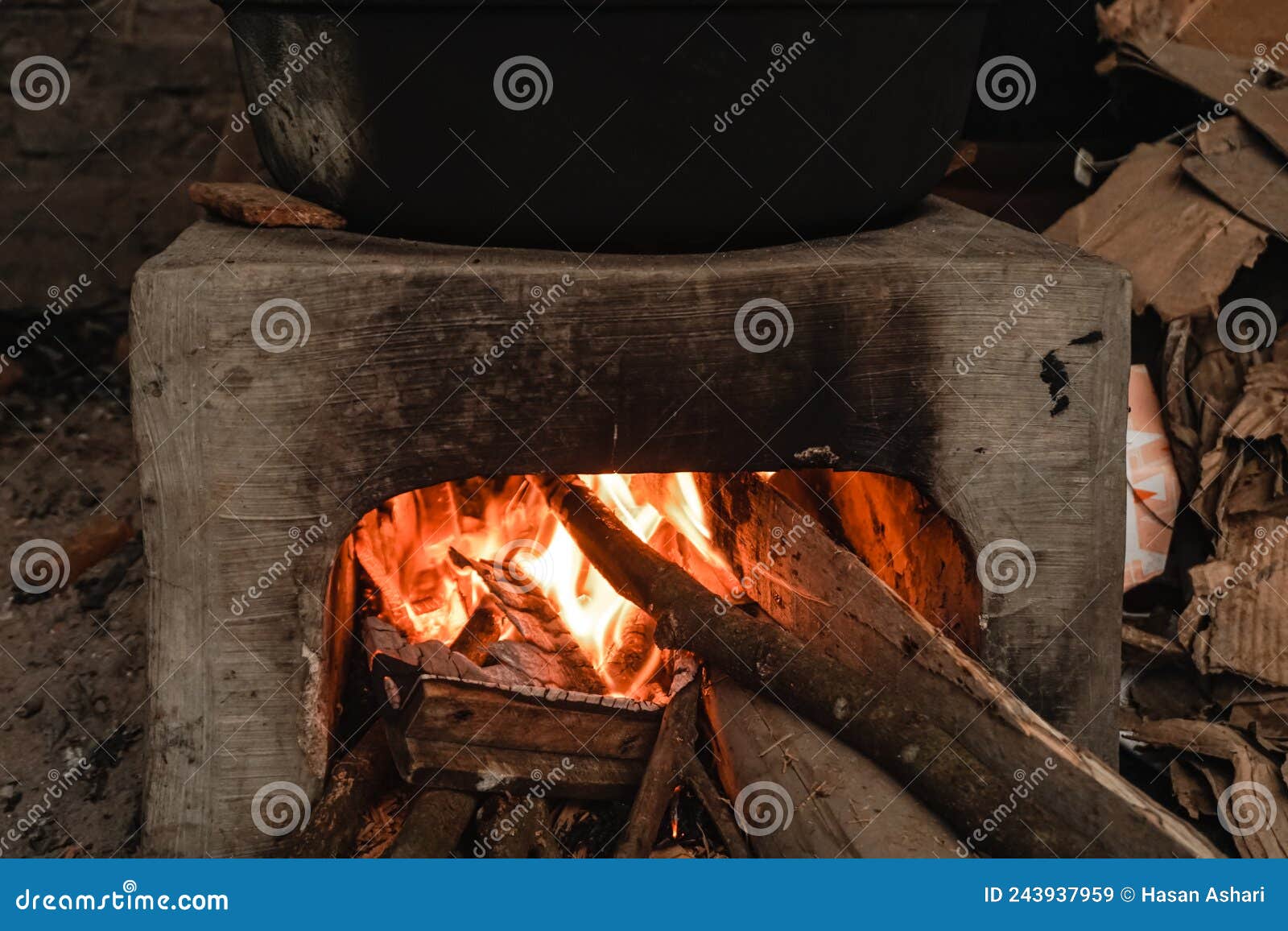 Traditional Cooking Method Using Firewood and Clay Stove Stock Image ...