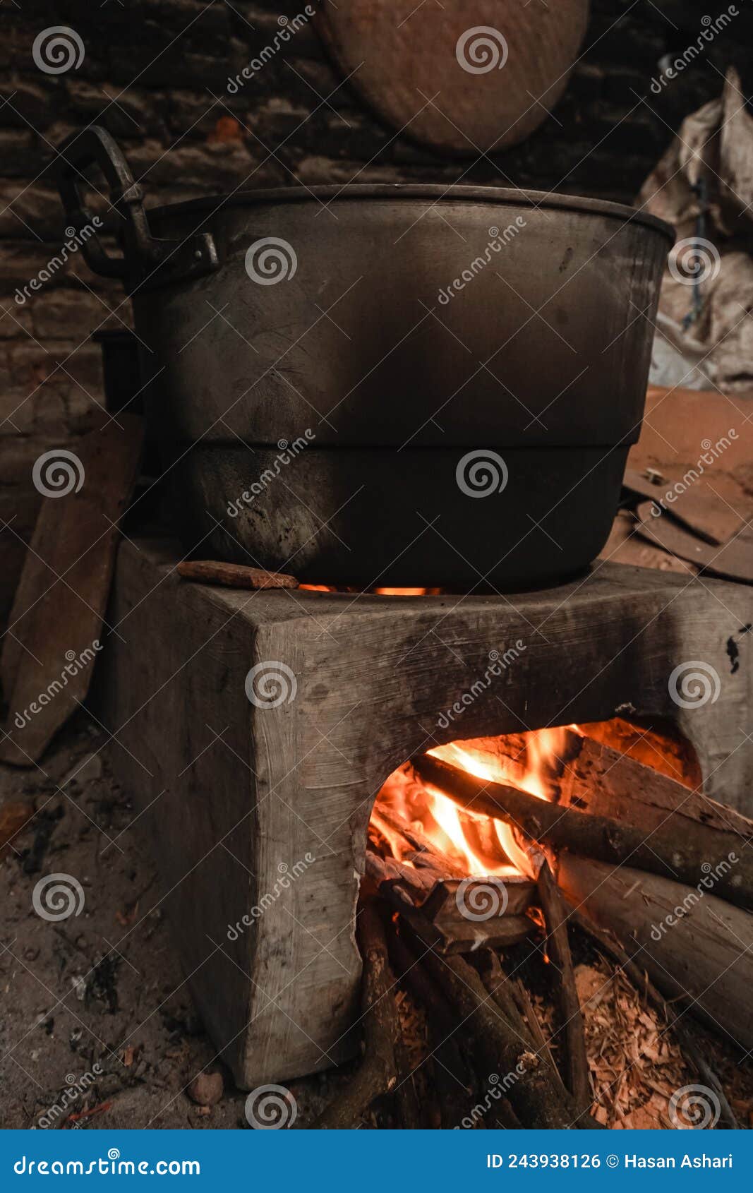 Traditional Cooking Method Using Firewood and Clay Stove Stock Photo ...