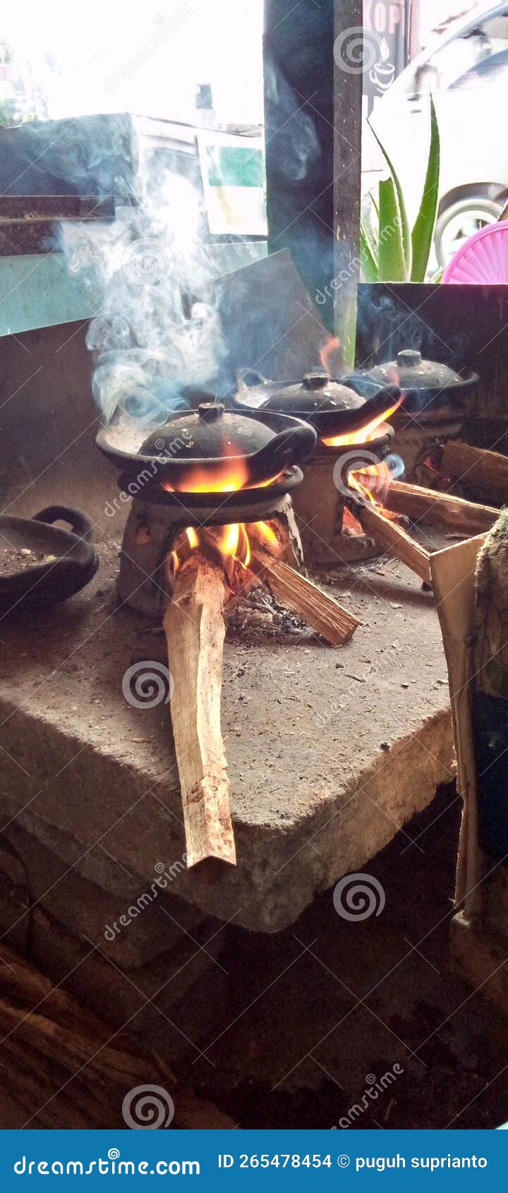 Traditional Cooking with a Wood Stove Stock Photo - Image of cook ...