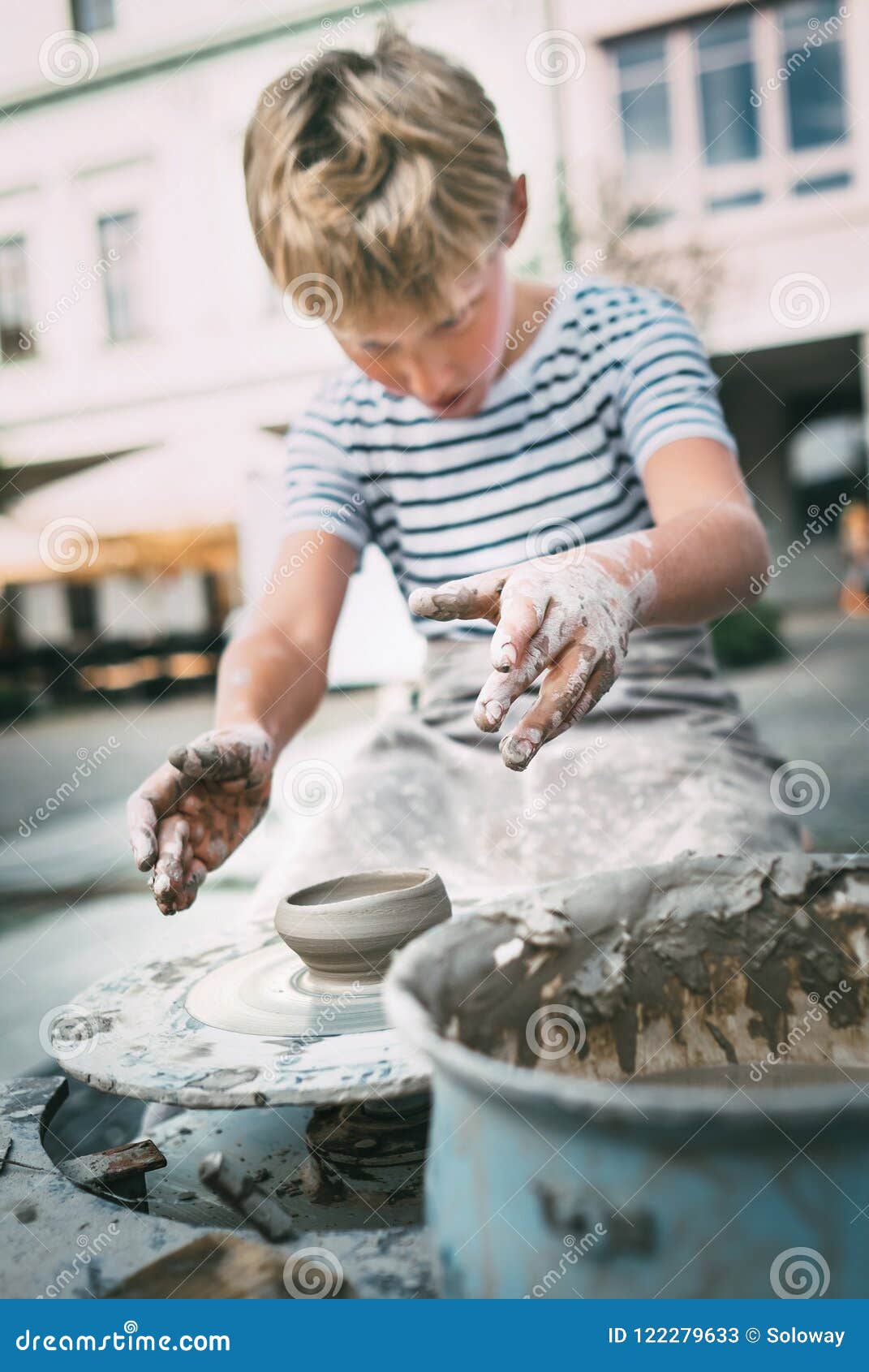 Traditional Craft Lesson: Boy Try To Make a Pottery Bowl Stock Image ...