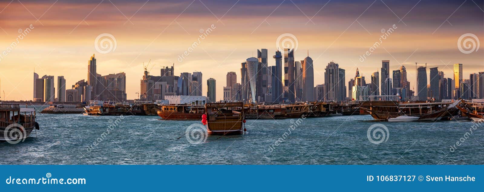 The Traditional Dhow Harbor in Front of the Modern Skyline of Doha ...