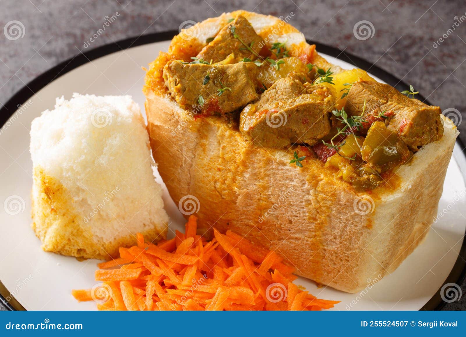 Traditional Durban Mutton Bunny Chow Closeup on Plate. Horizontal Stock ...