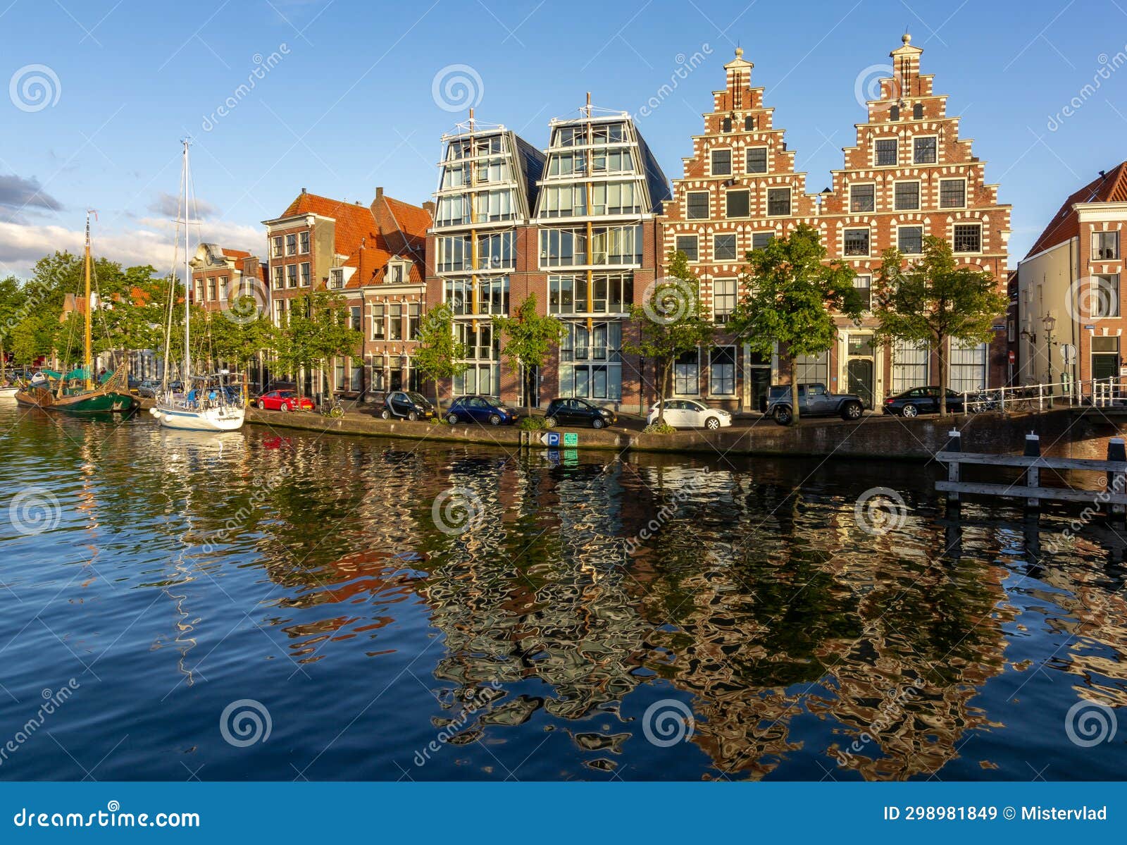 Traditional Dutch Architecture Reflected in Water, Haarlem Canals ...