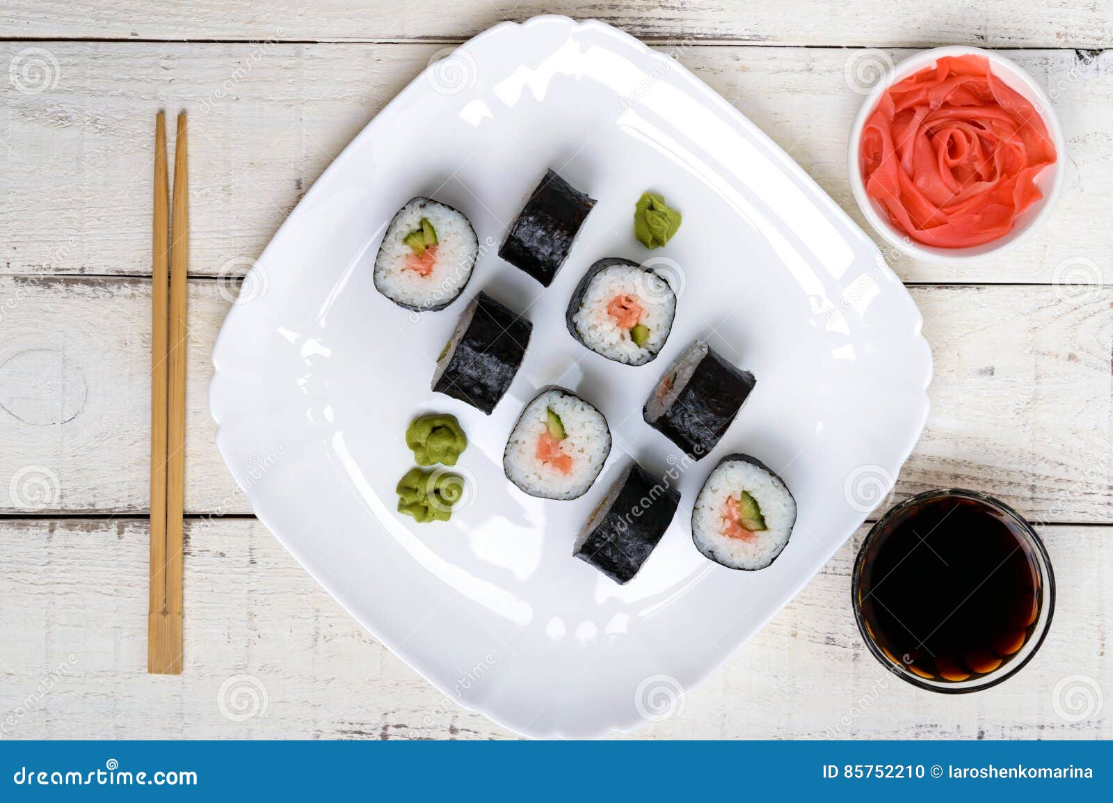 Traditional Eastern Dish with Salmon Sushi Rolls on a White Plate ...