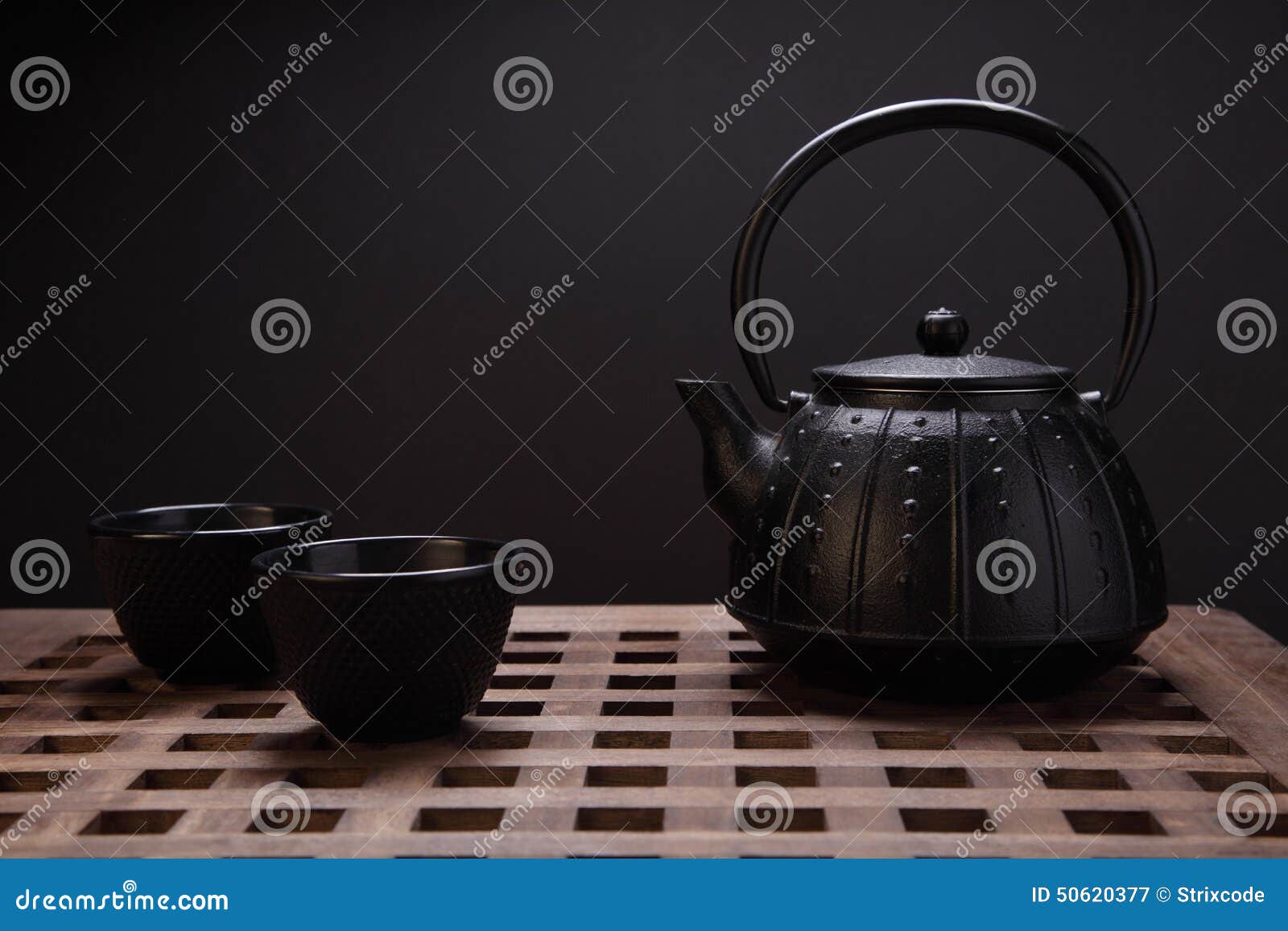 Traditional Eastern Teapot and Teacups on Wooden Desk Stock Image ...